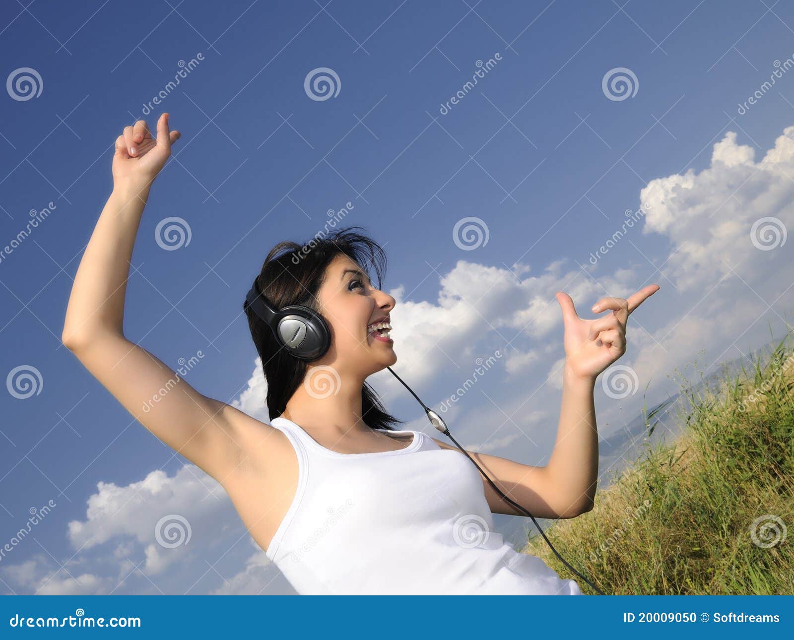 Beautiful Woman Enjoying Music Stock Photo - Image of lawn, listening ...