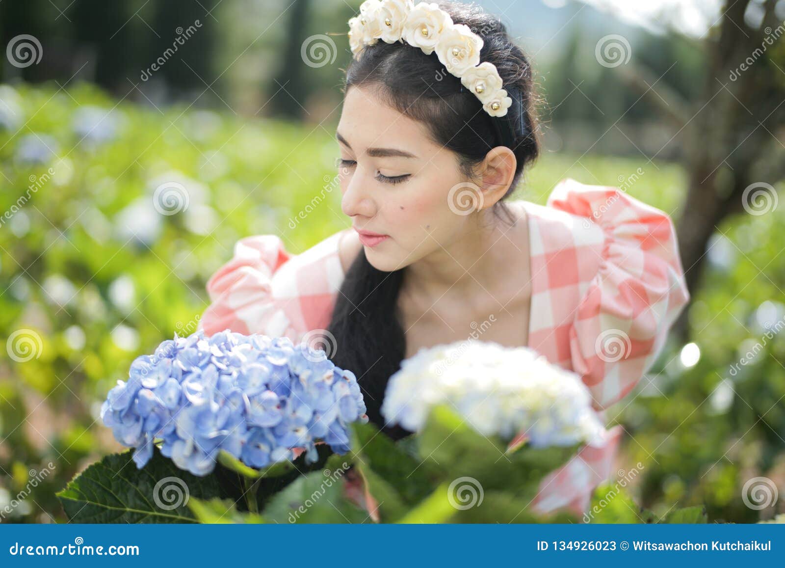 Beautiful Woman in the Flower Garden Stock Image - Image of girl, green ...