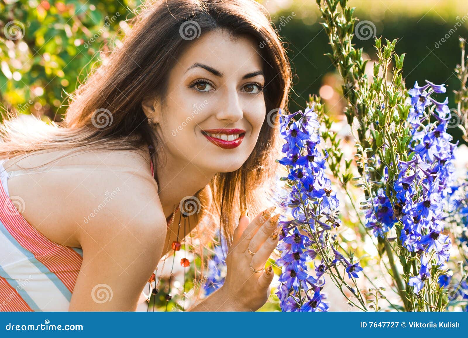 Beautiful woman in garden stock image. Image of color - 7647727