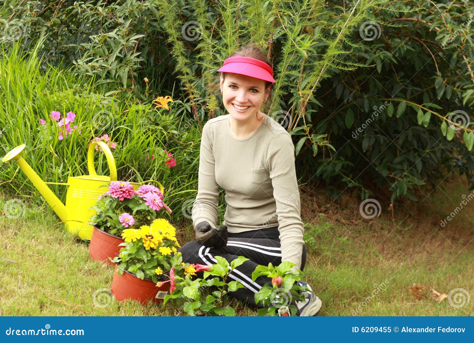 Beautiful woman gardener stock image. Image of hold, gardening - 6209455