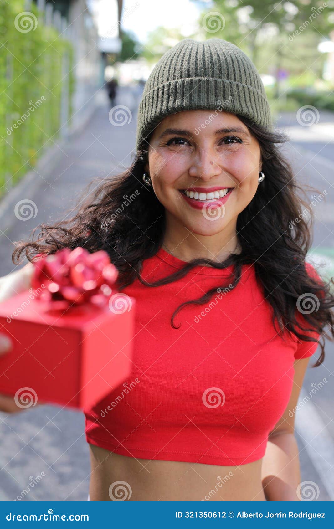 Beautiful Woman Giving a Present Stock Photo - Image of give, female ...
