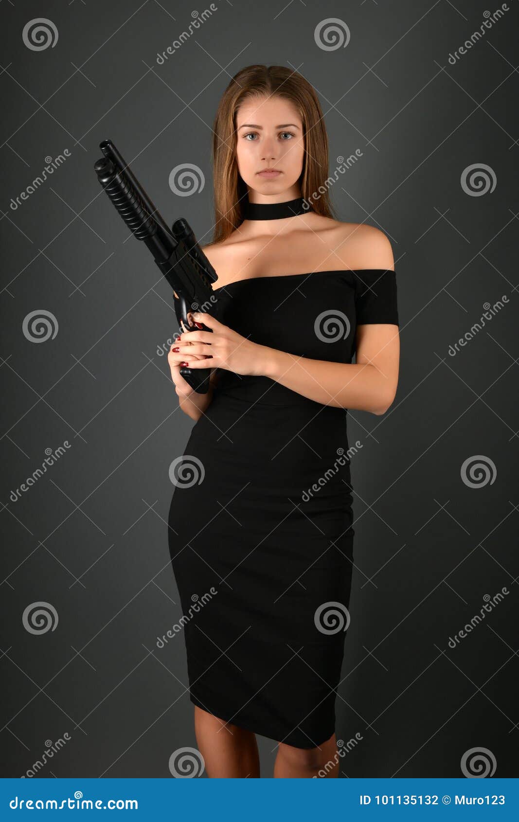 Beautiful woman with gun stock photo. Image of agent - 101135132
