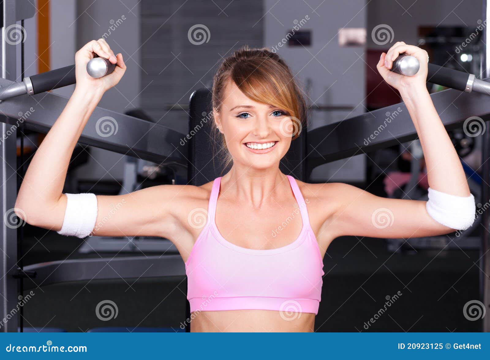 Beautiful woman at the gym stock image. Image of fitness - 20923125