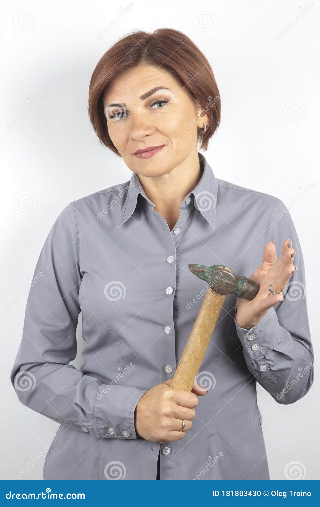 Beautiful Woman with a Hammer in Her Hand Stock Photo - Image of ...