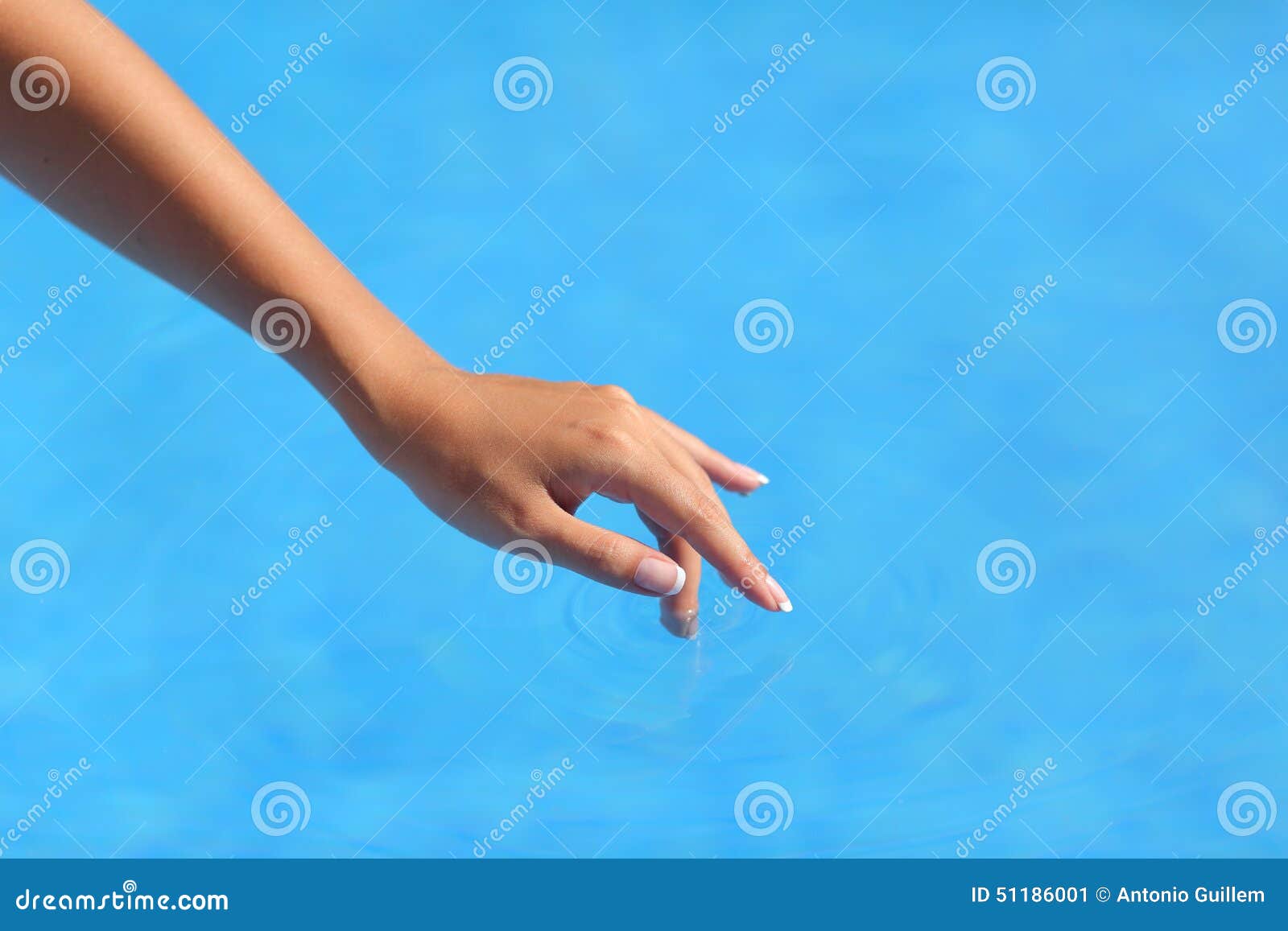 Beautiful Woman Hand Touching Blue Water in a Pool Stock Image - Image ...