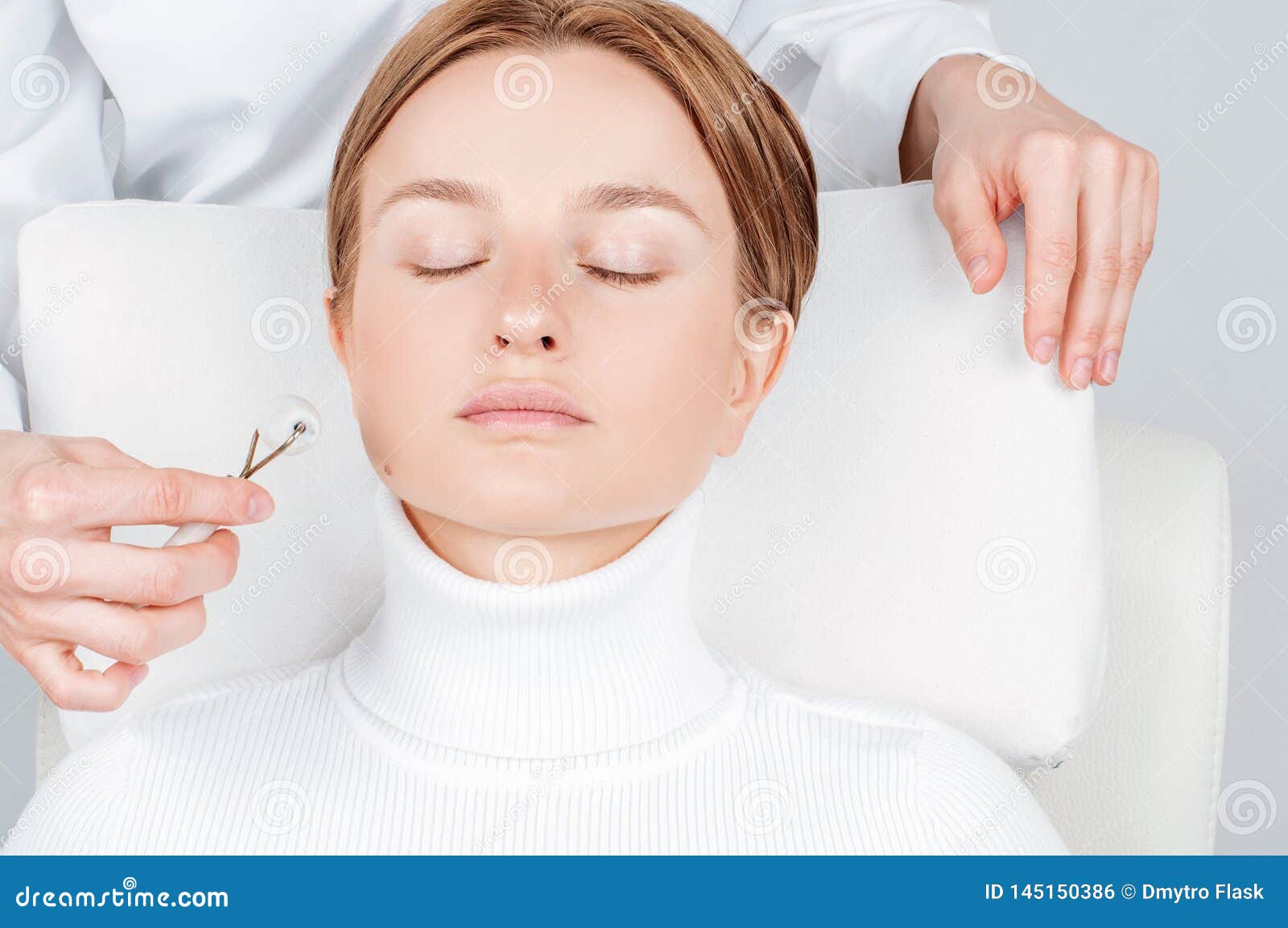 Beautiful Woman Having Face Treatment Cosmetologist Massaging Face