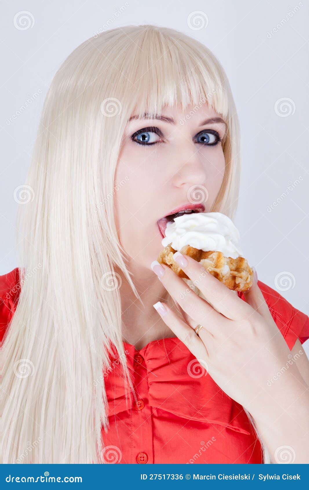 Beautiful Woman Having a Snack Stock Photo - Image of food, cream: 27517336