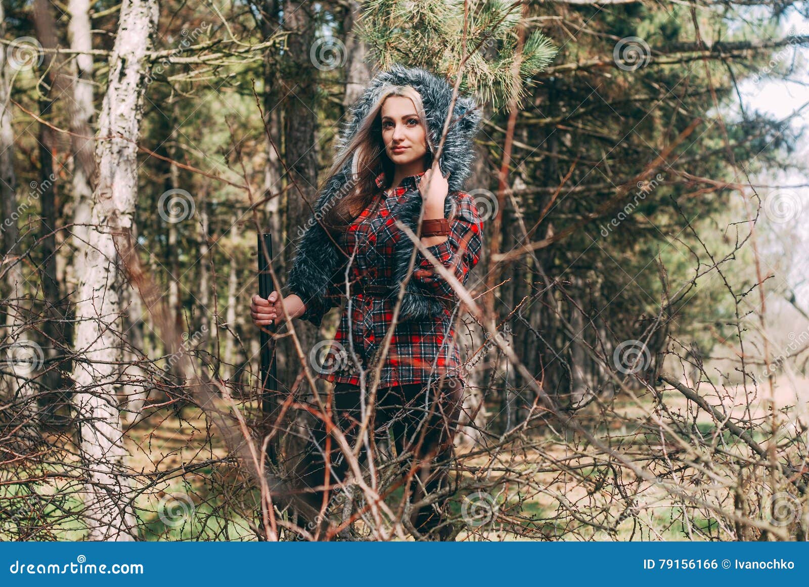 Beautiful Woman Hunter in Forest with Gun Stock Photo - Image of ...