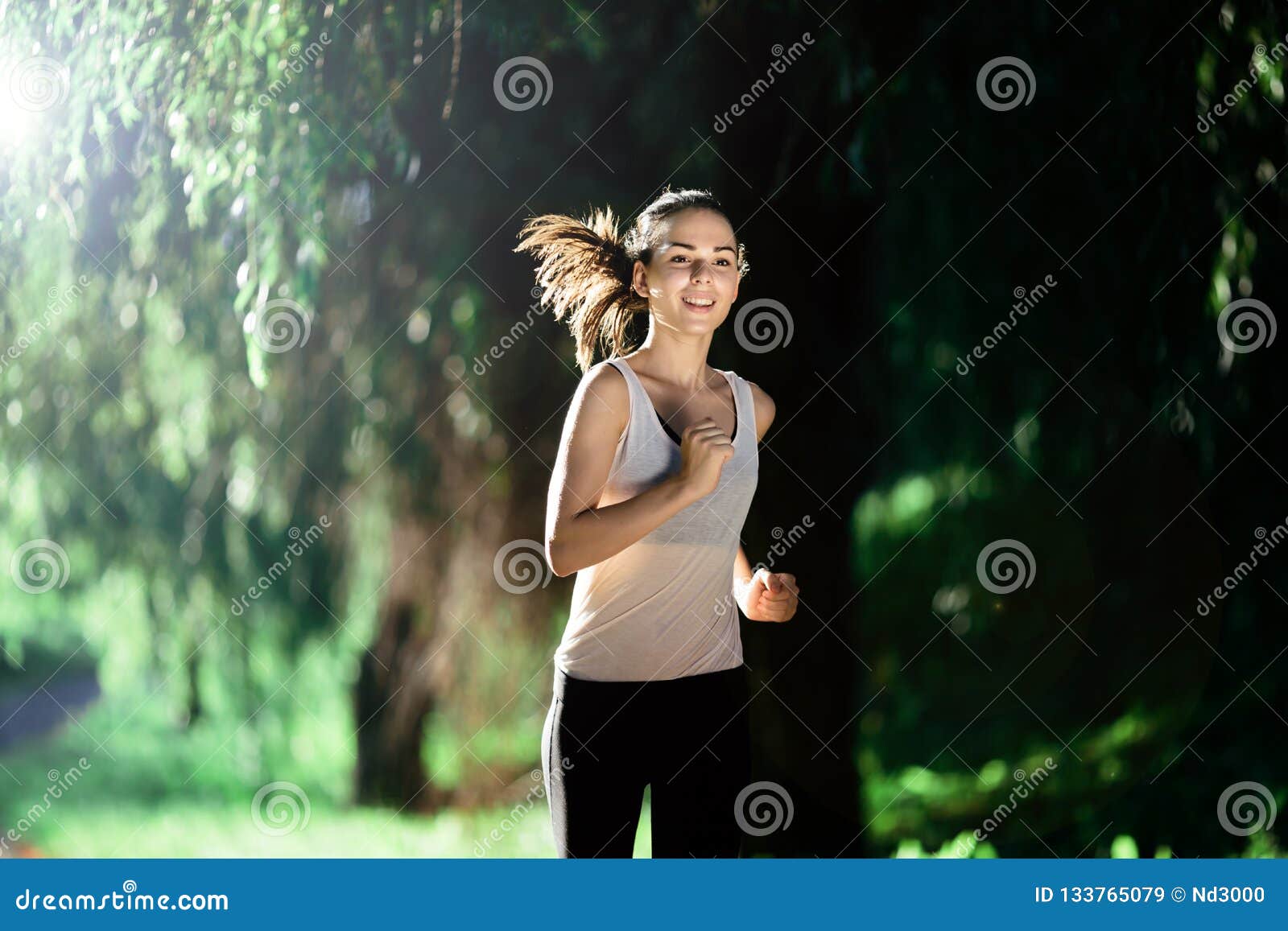 Beautiful Woman Jogging in Nature Stock Image - Image of green, female ...