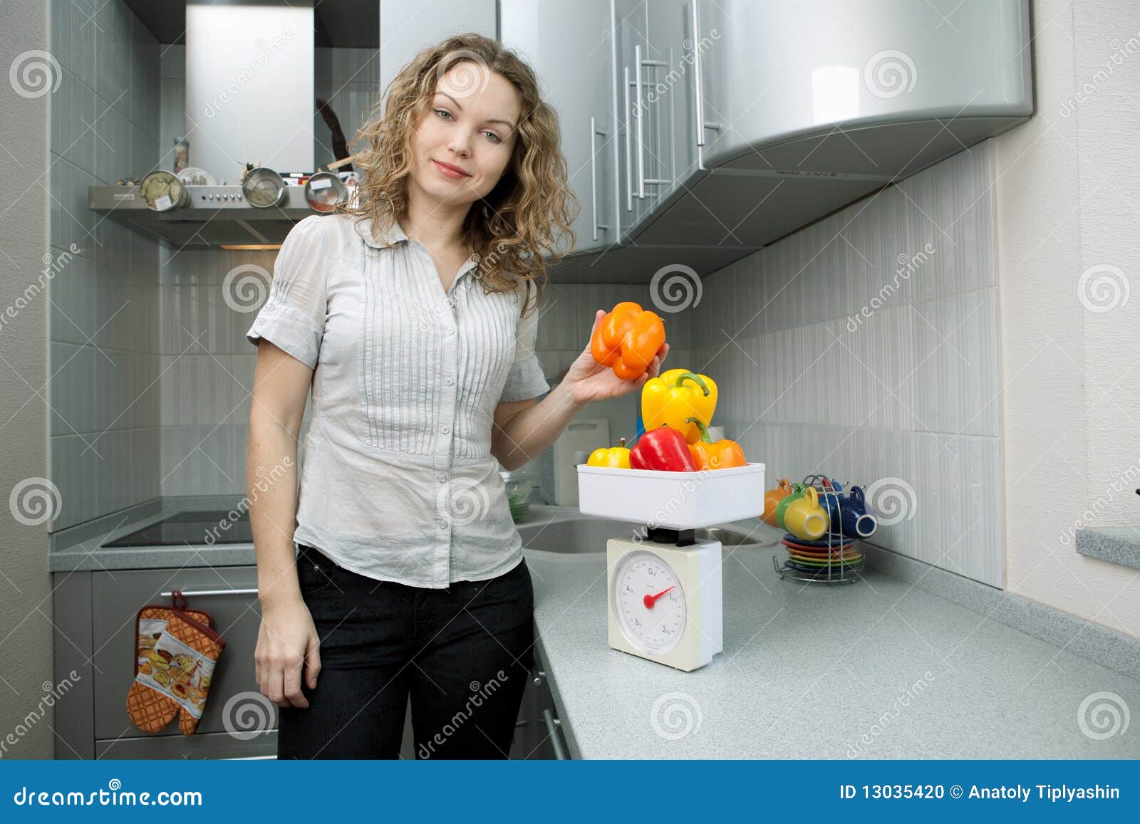 Beautiful woman in kitchen stock photo. Image of female - 13035420
