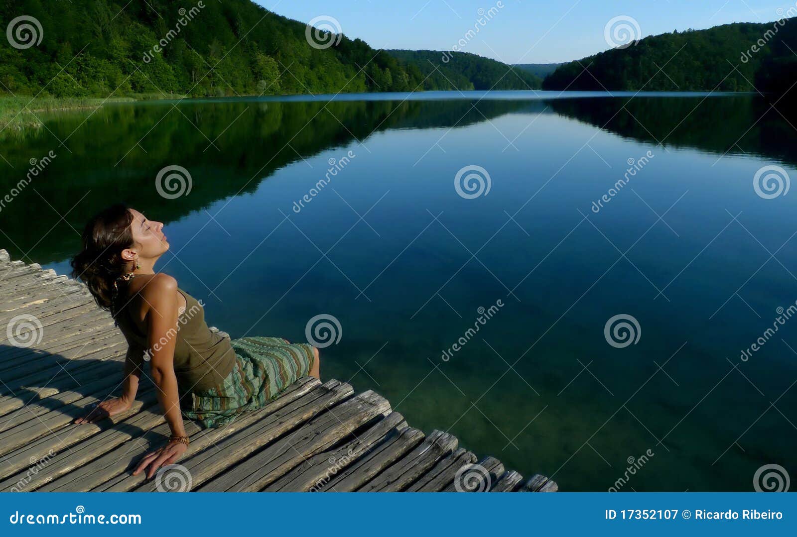 Beautiful Woman by a Lake stock image. Image of person - 17352107