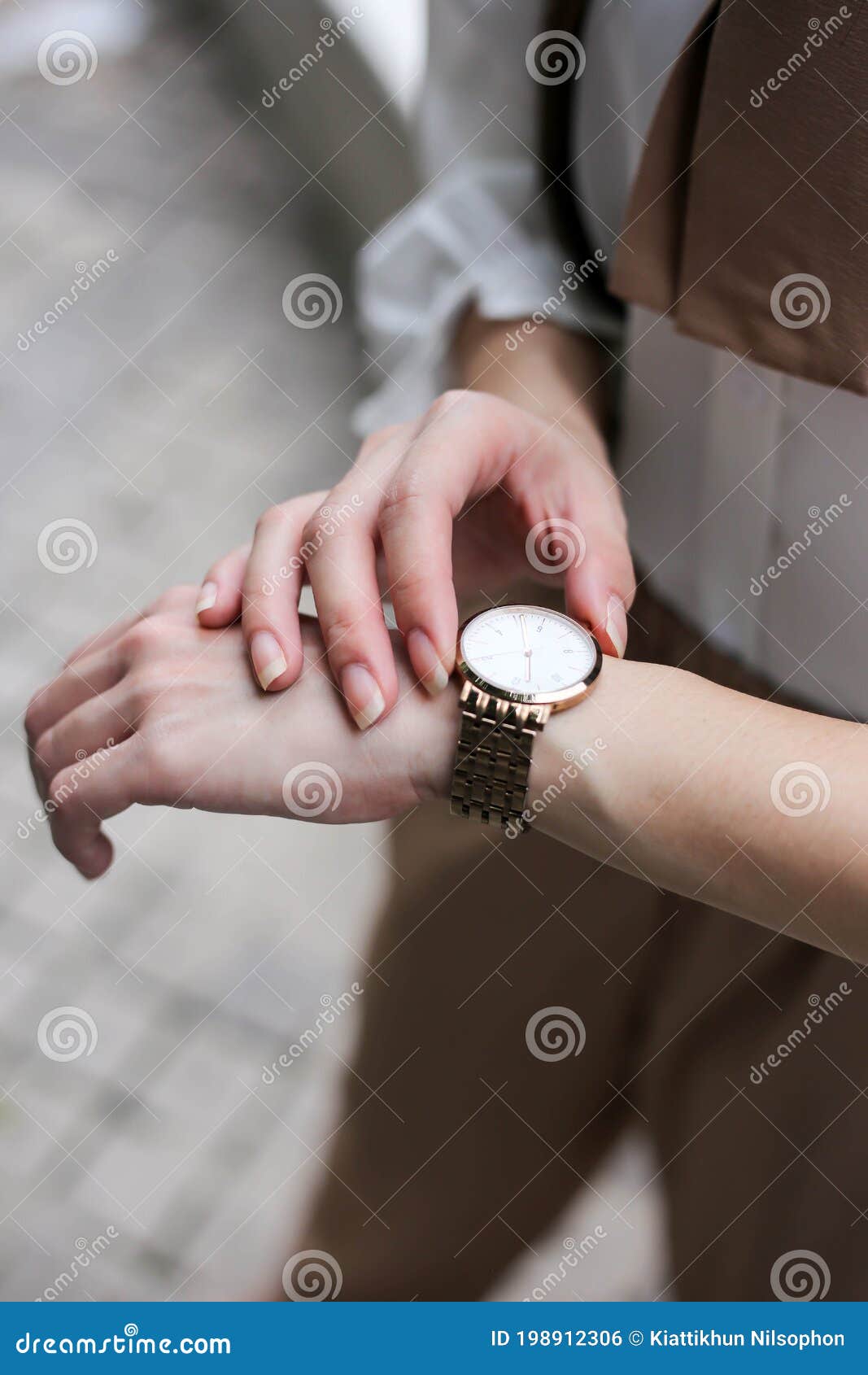Beautiful Woman Looking at Her Watch Stock Photo - Image of lady ...