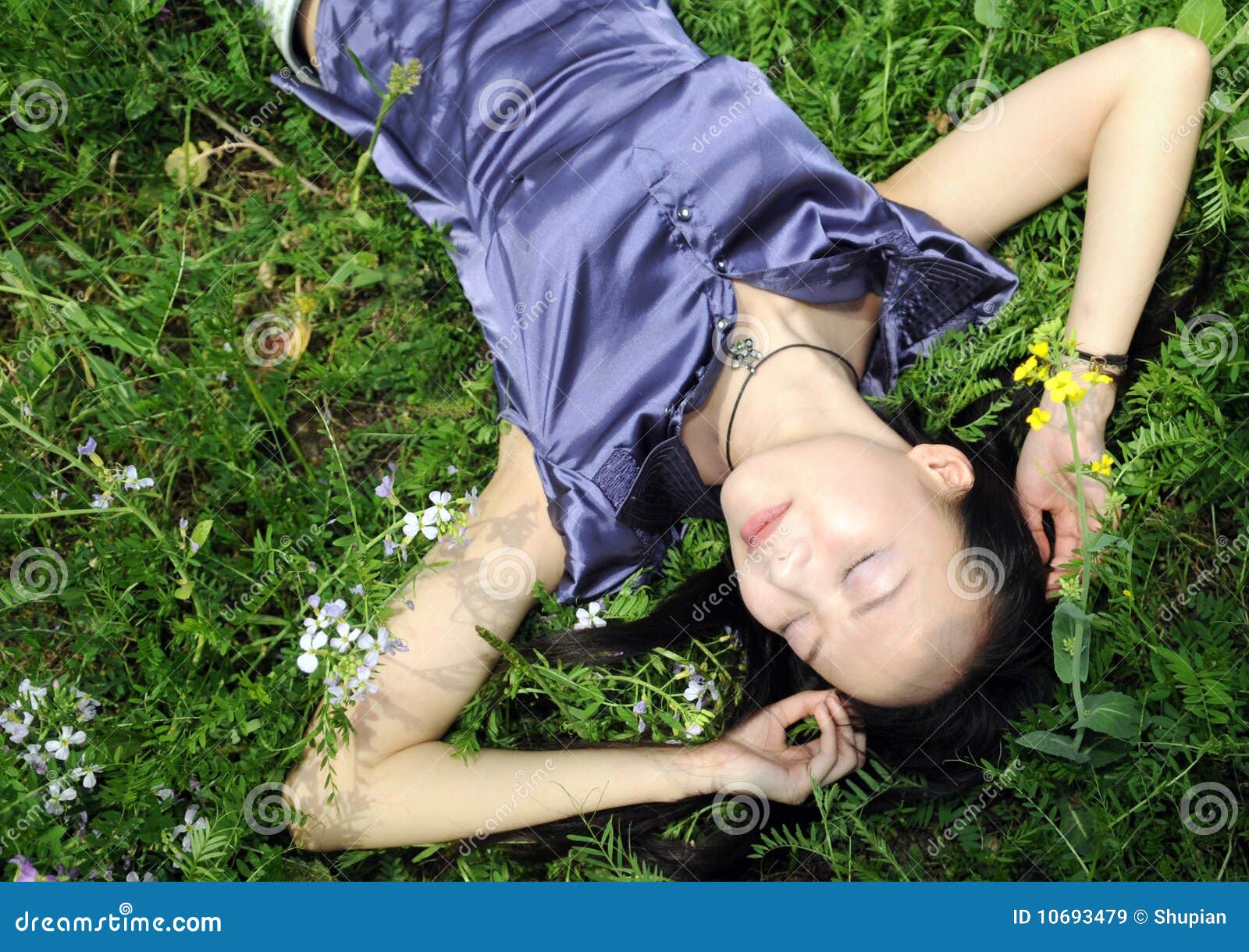 Beautiful woman lying down stock image. Image of green - 10693479
