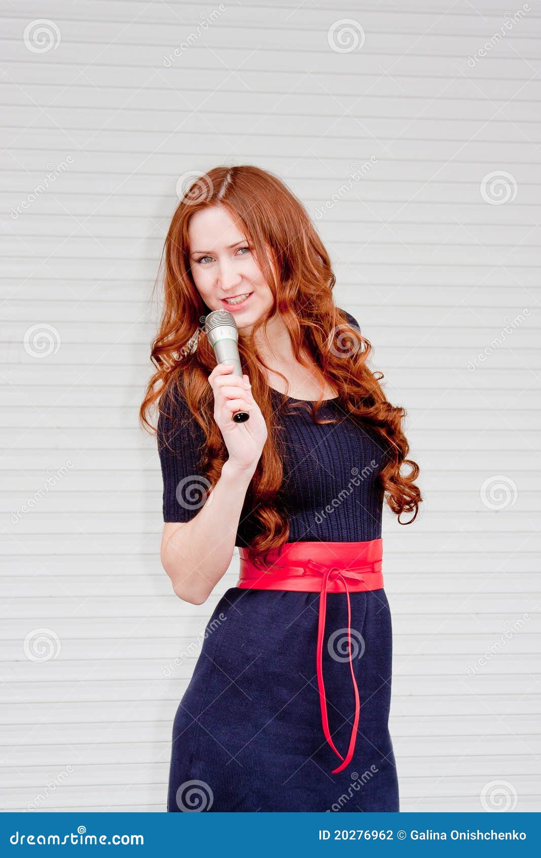 Beautiful Woman with a Microphone in Hands Stock Photo - Image of ...