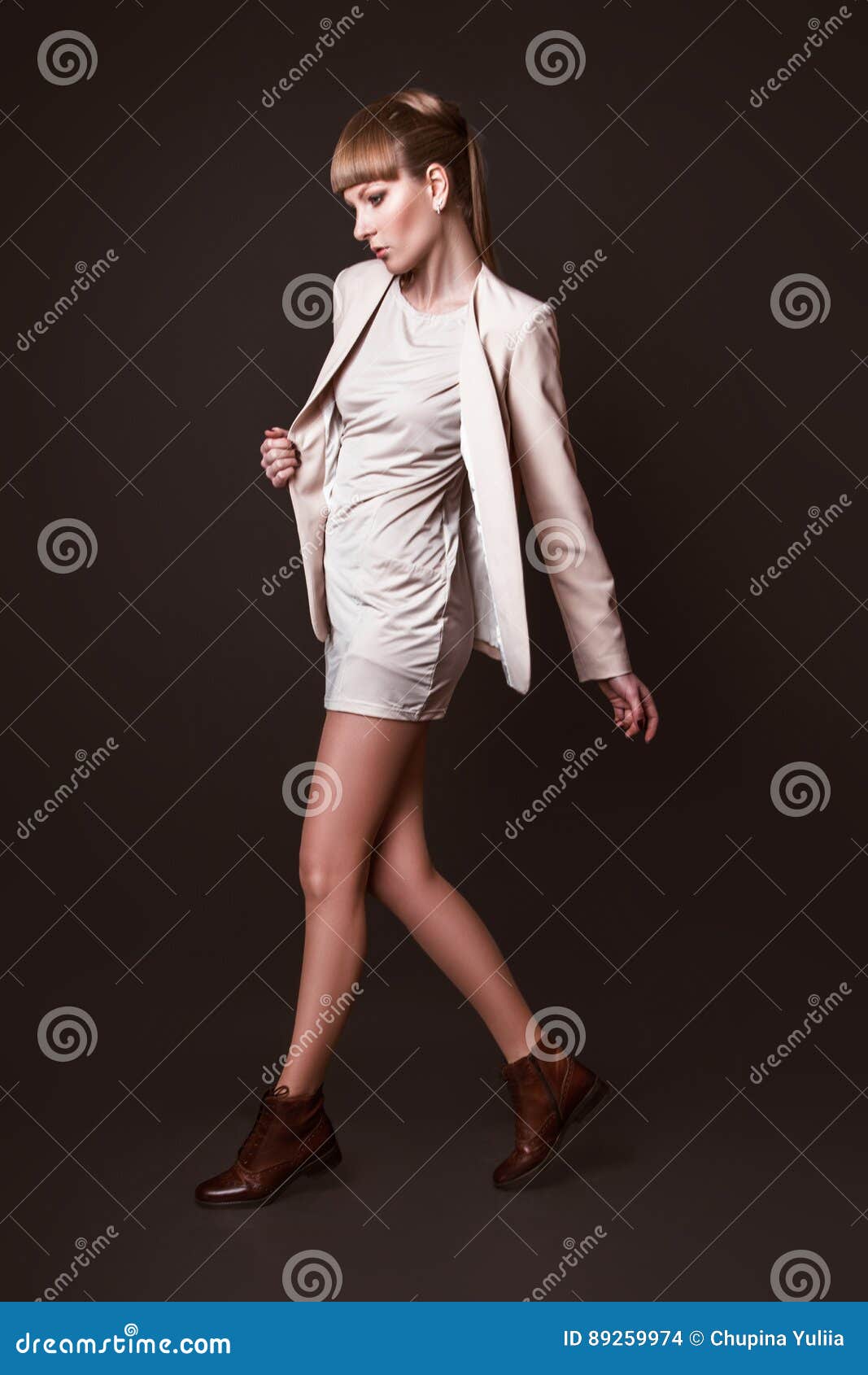 Beautiful Woman Model Posing in the Studio on Black Background Stock ...