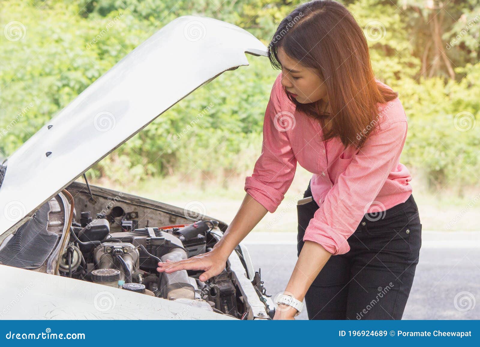 Beautiful Woman Need Help. Woman Trying To Fix Car Engine on the Road ...