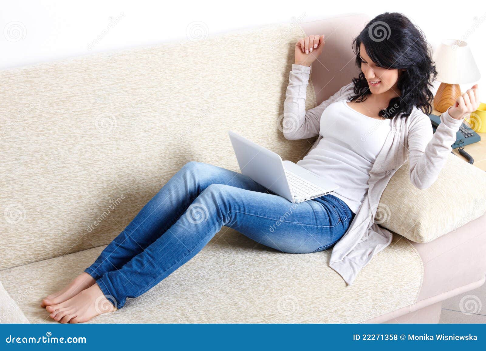 Beautiful Woman with Netbook Laying on Sofa Stock Photo - Image of ...