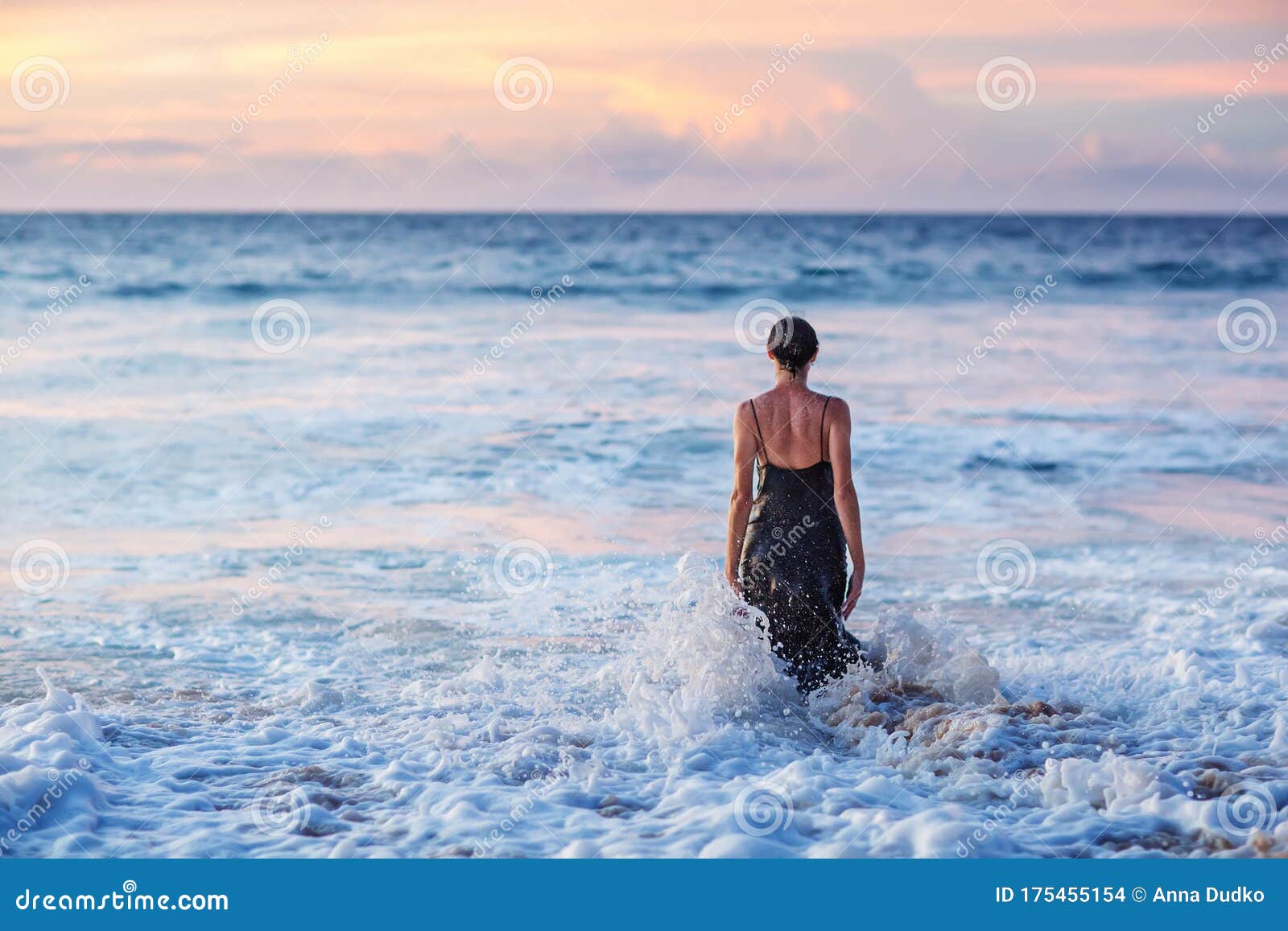 Beautiful Woman by the Ocean at Sunset Stock Photo - Image of peace ...