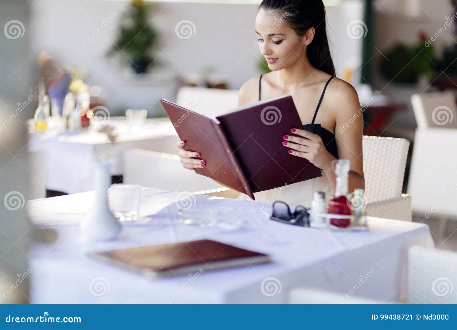 Beautiful Woman Ordering from Menu Stock Image - Image of beautiful ...