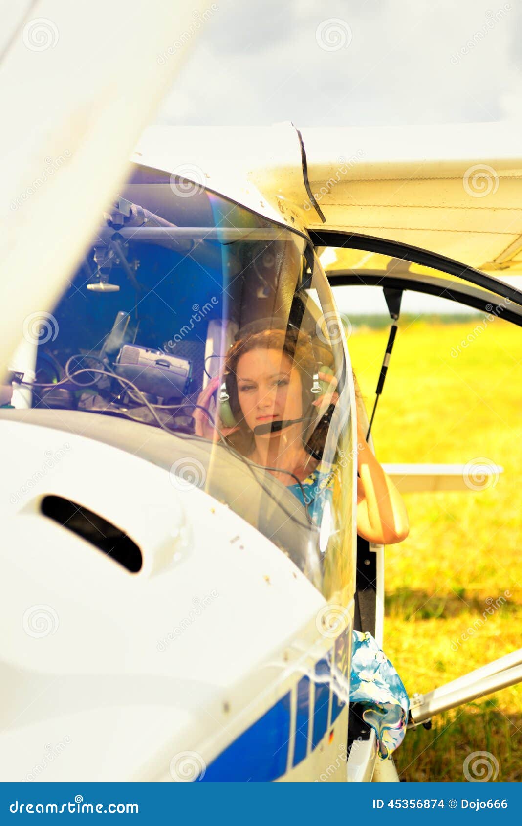 Beautiful Woman the Pilot in a Cockpit of the Ultralight Plane Stock ...