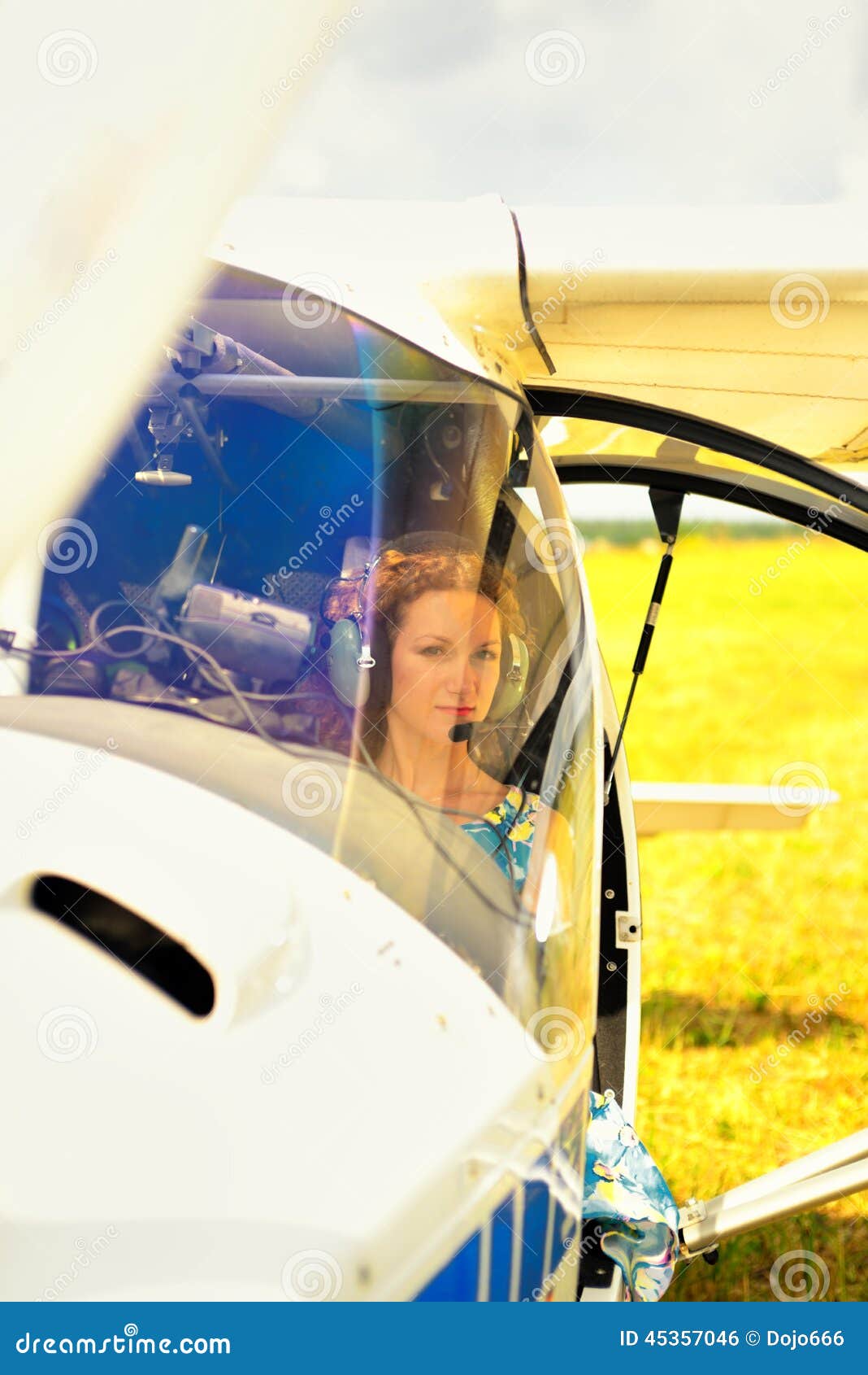 Beautiful Woman the Pilot in a Cockpit of the Ultralight Plane Stock ...