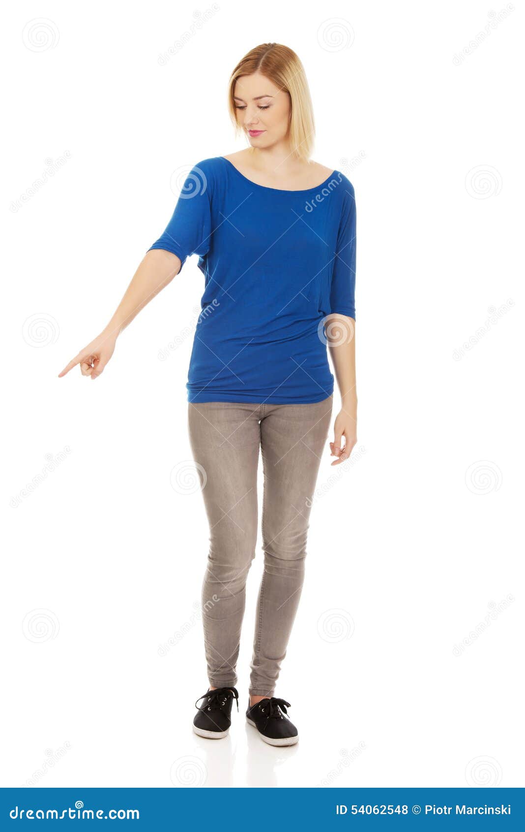 Beautiful Woman Pointing Down. Stock Photo - Image of studio, isolated ...