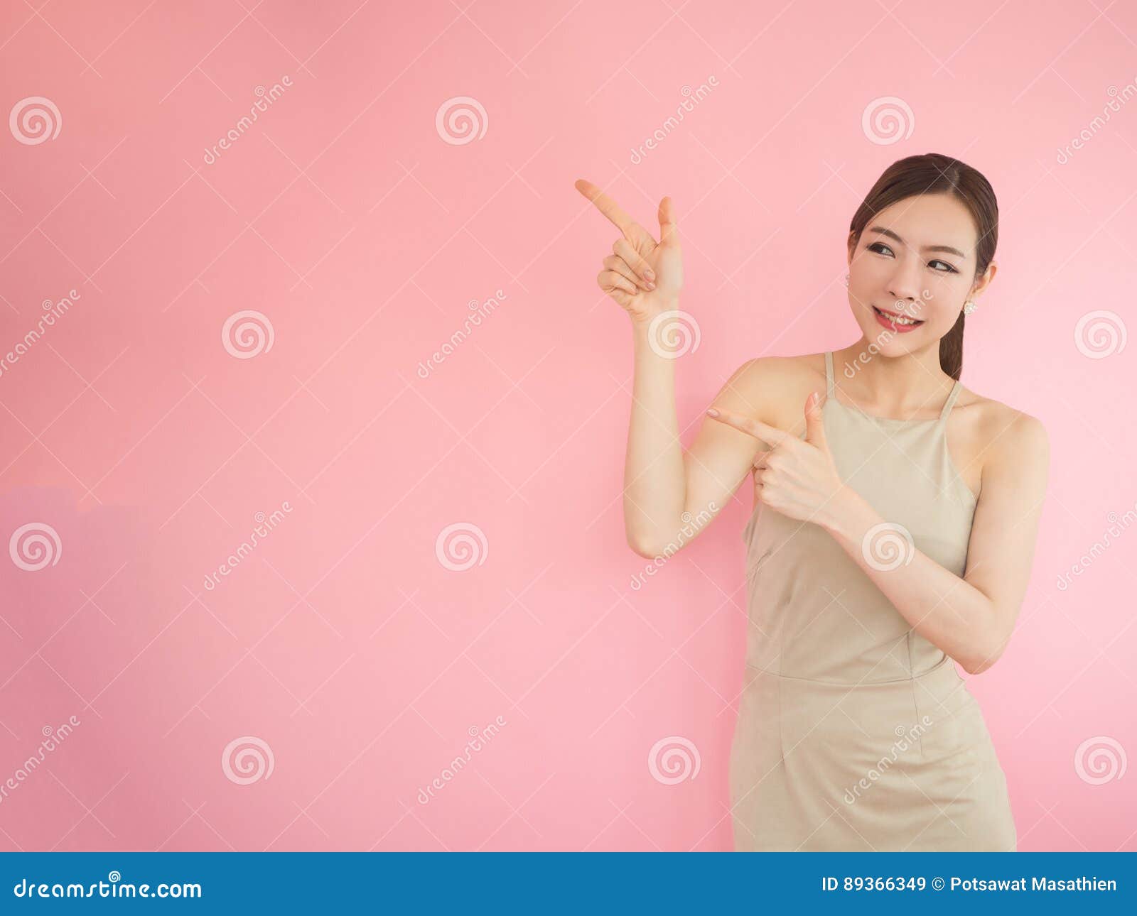Beautiful Woman Pointing Two Fingers Left Stock Image - Image of ...