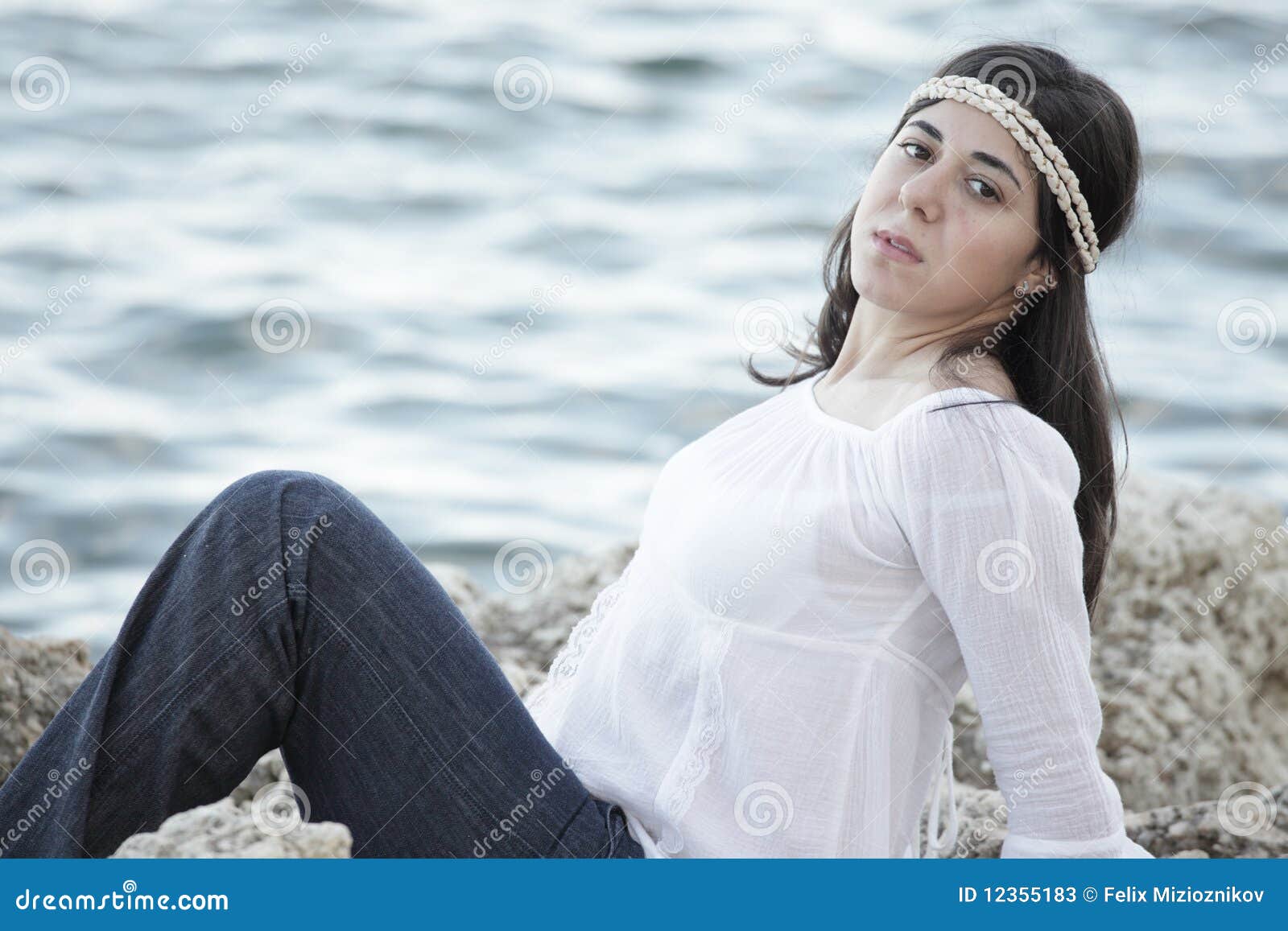 Beautiful Woman Posing on the Rocks Stock Image - Image of horizontal ...
