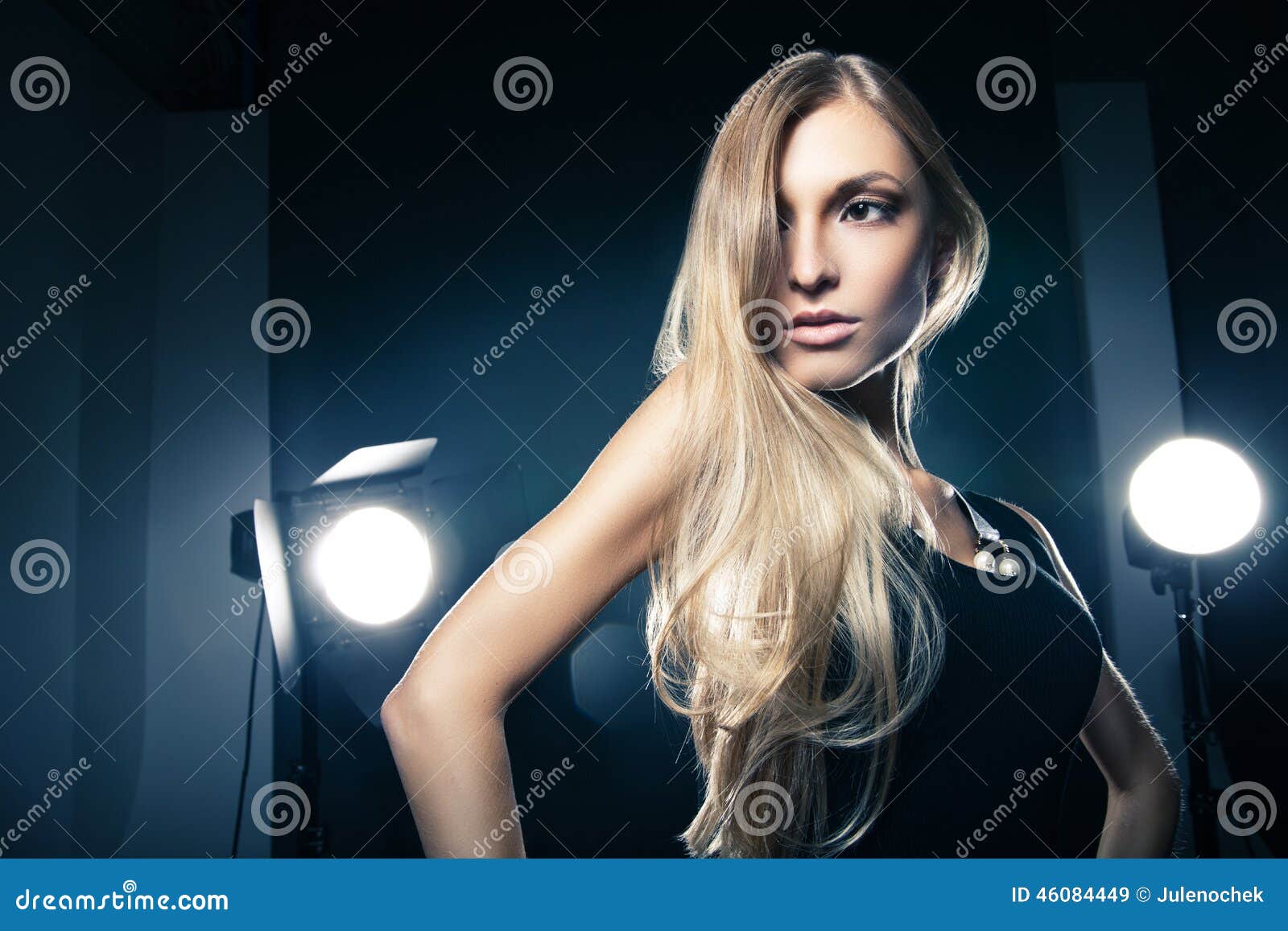 Beautiful Woman Posing at Studio in Light Flashes Stock Image - Image ...