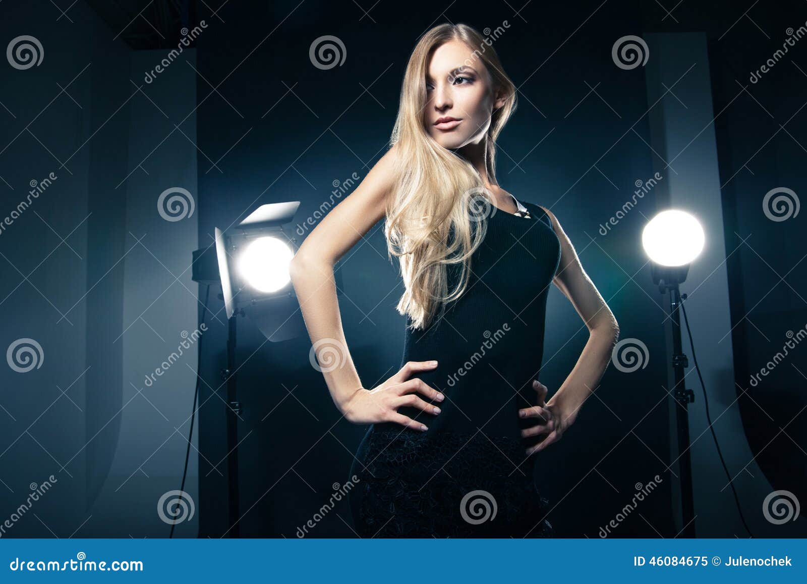 Beautiful Woman Posing at Studio in Light Flashes Stock Image - Image ...