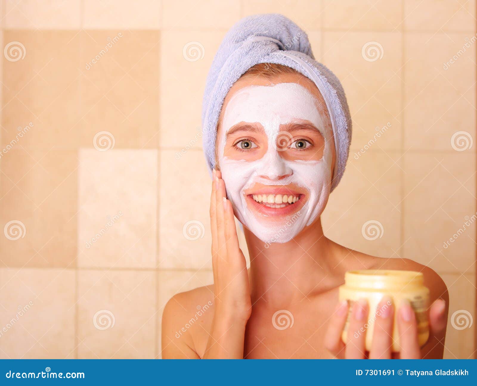 Beautiful Woman Puts on the Face a Mask Stock Image - Image of adult ...