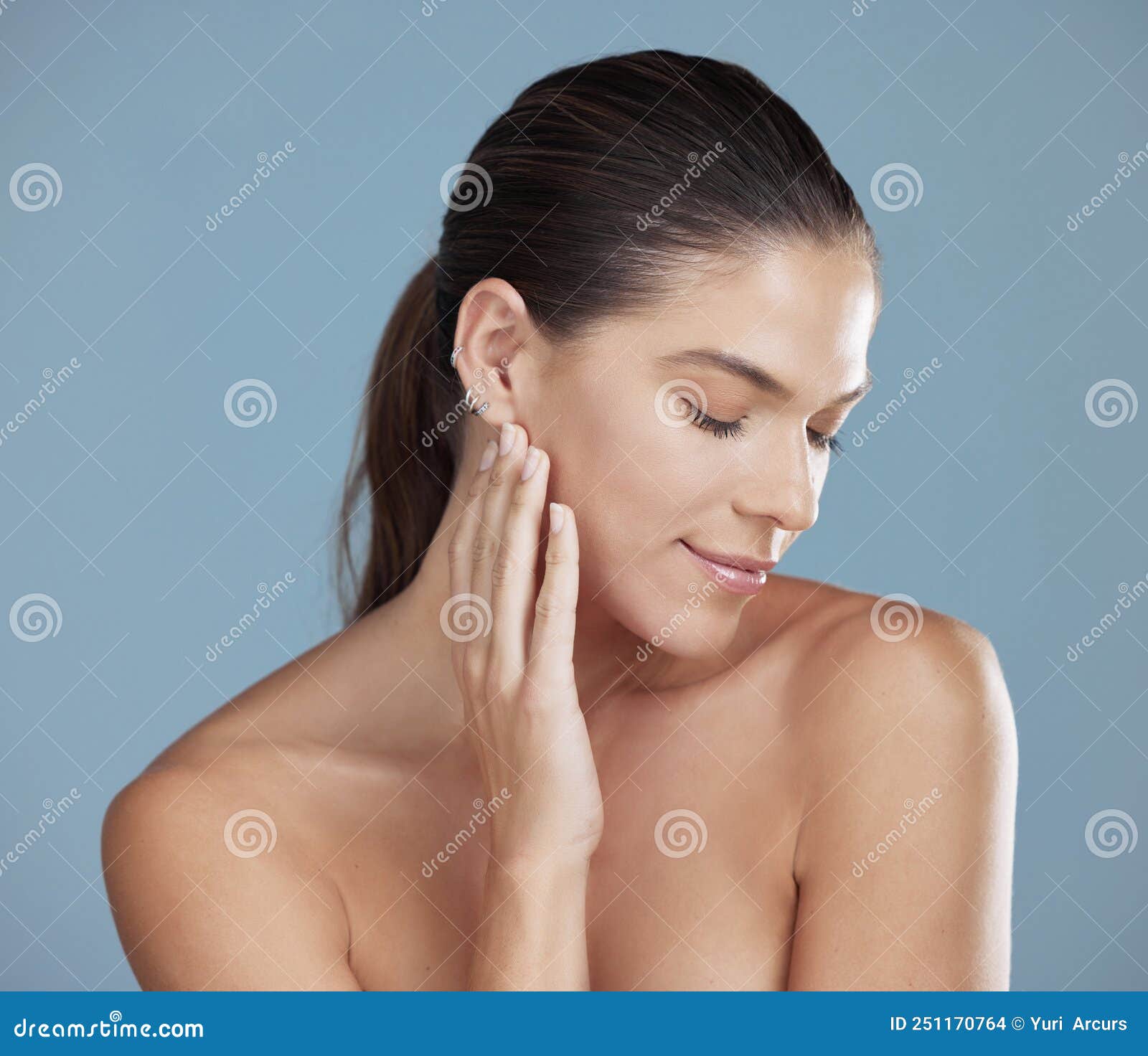 My Skin Is So Soft A Beautiful Woman With Radiant Skin Posing In The