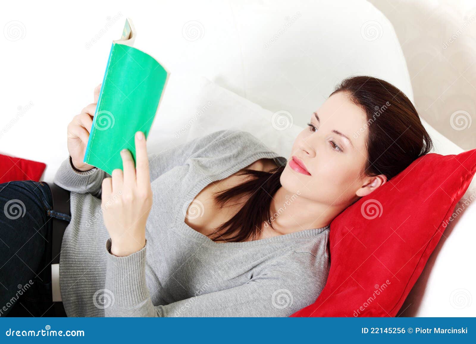 Beautiful Woman Reading a Book on a Sofa. Stock Photo - Image of jolly ...