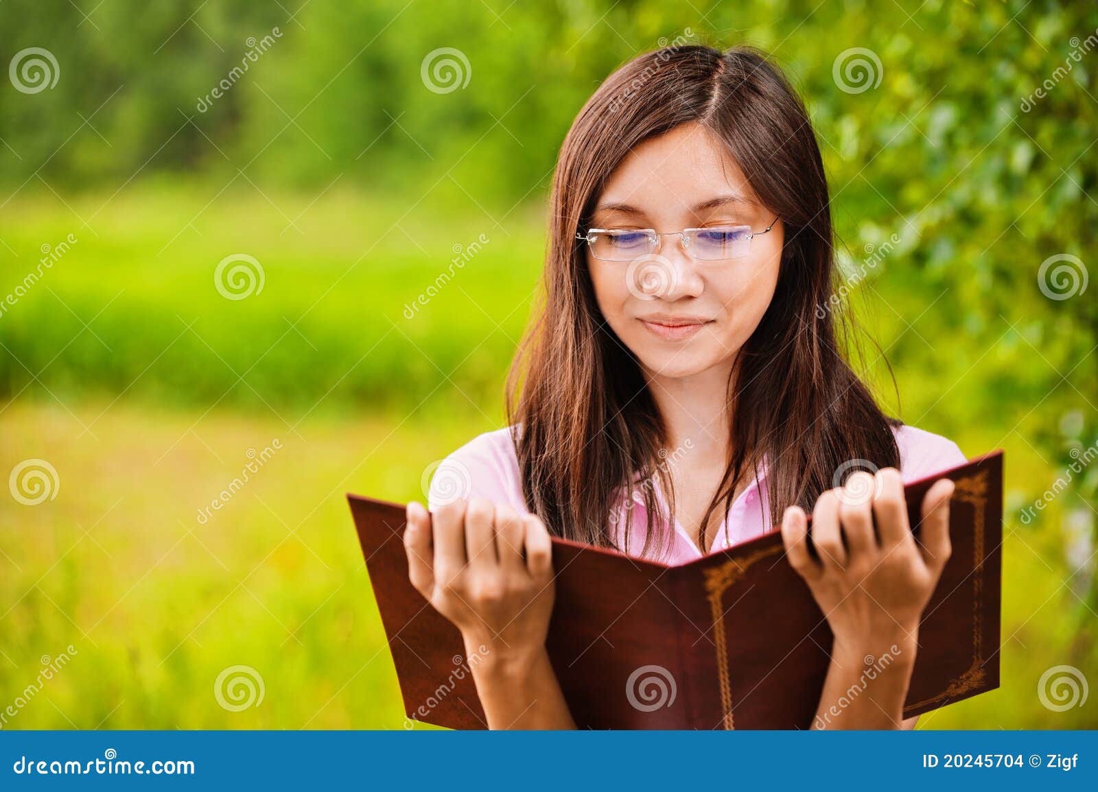 Beautiful woman reads book stock photo. Image of attentive - 20245704