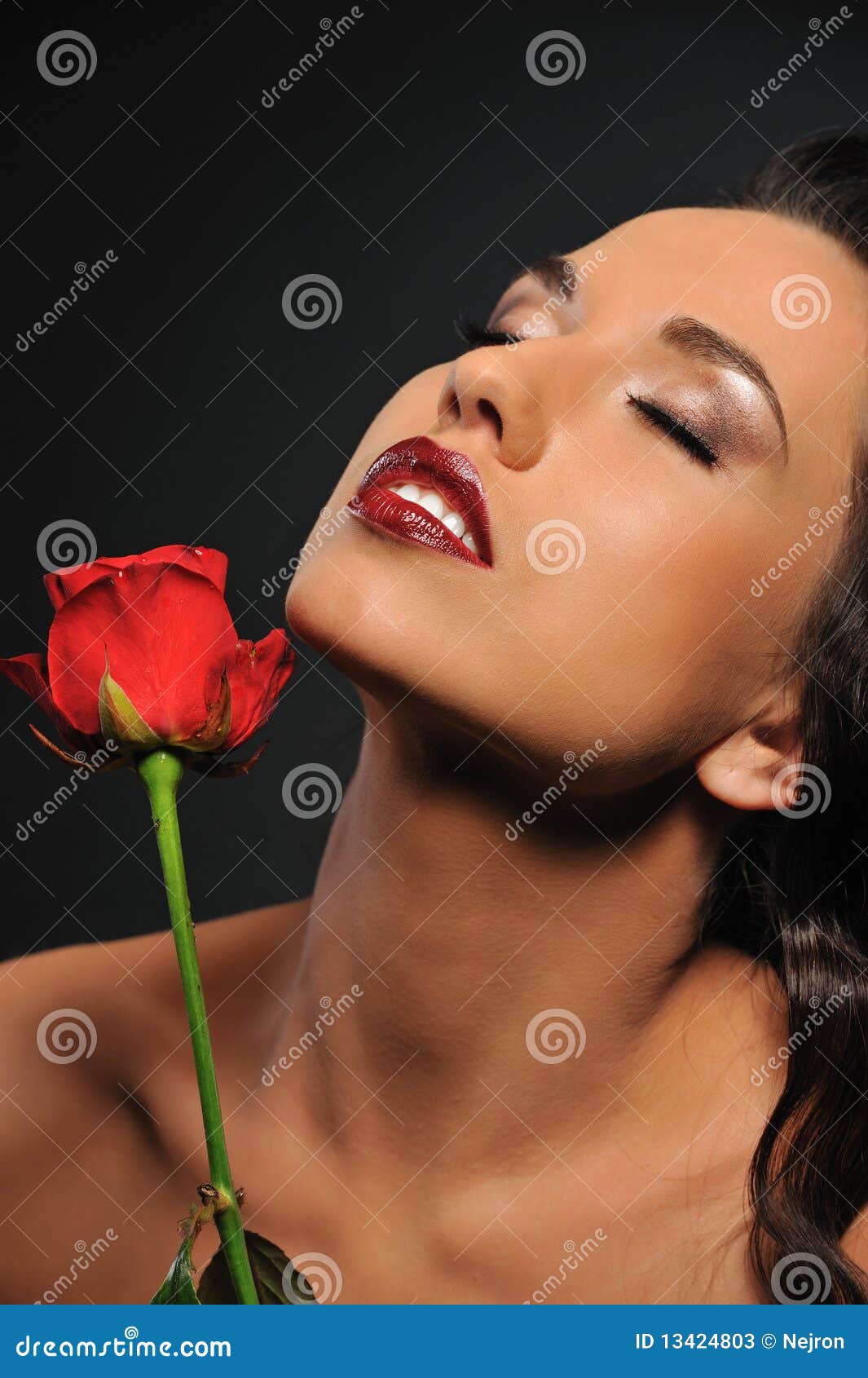 Beautiful Woman with a Red Rose Stock Image - Image of closed, beauty ...