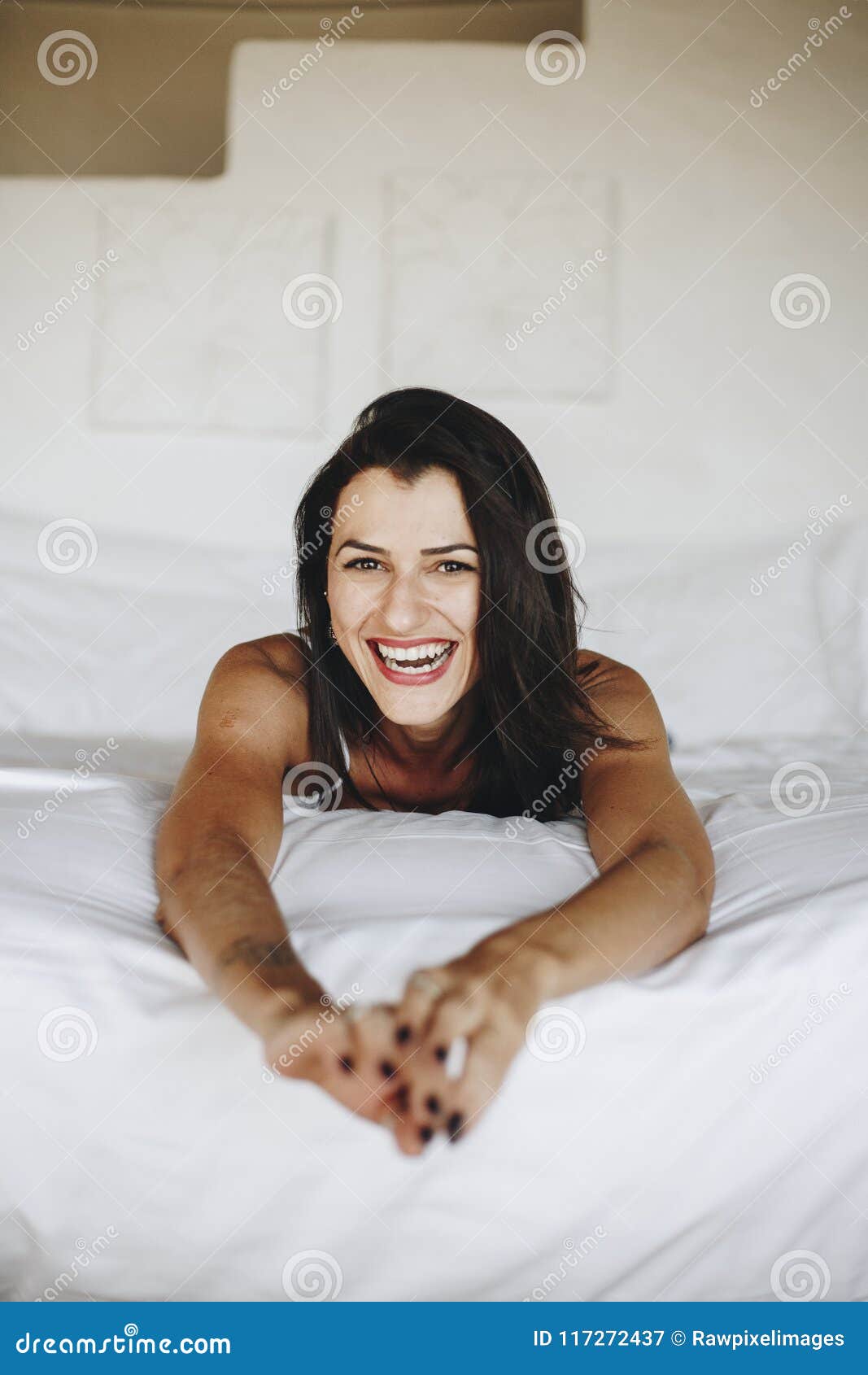 Beautiful Woman Relaxing in Bed Stock Image - Image of island, laughing ...
