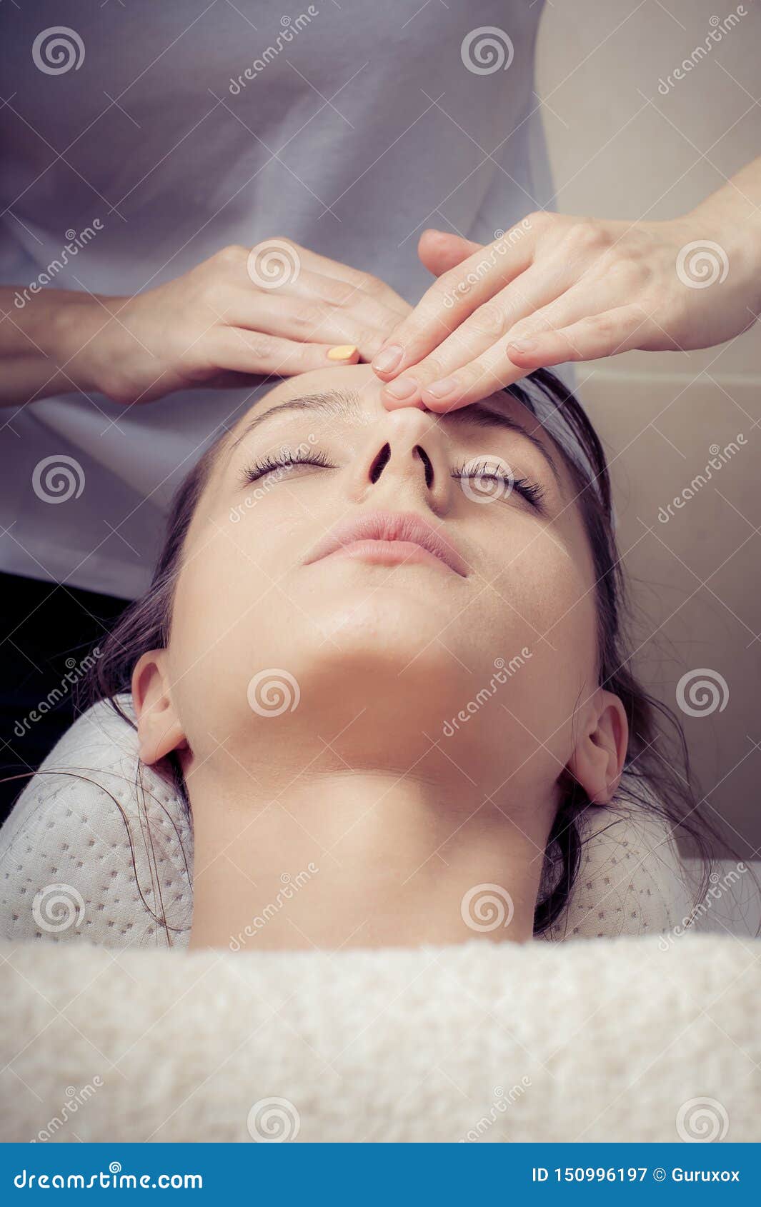 Beautiful Woman Relaxing With Face Massage At Luxury Spa Salon Stock