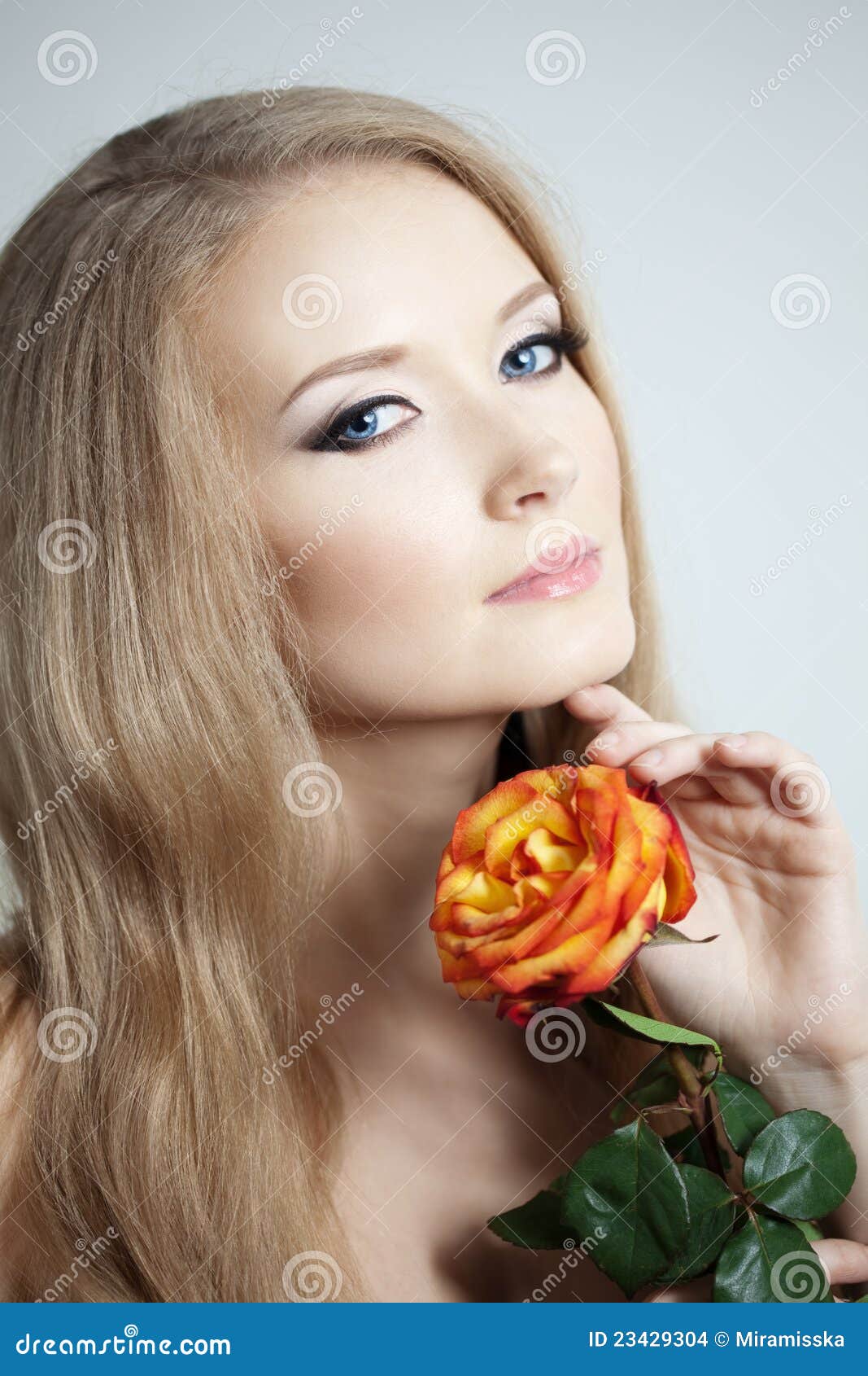 Beautiful Woman with a Rose Stock Photo - Image of glamour, care: 23429304