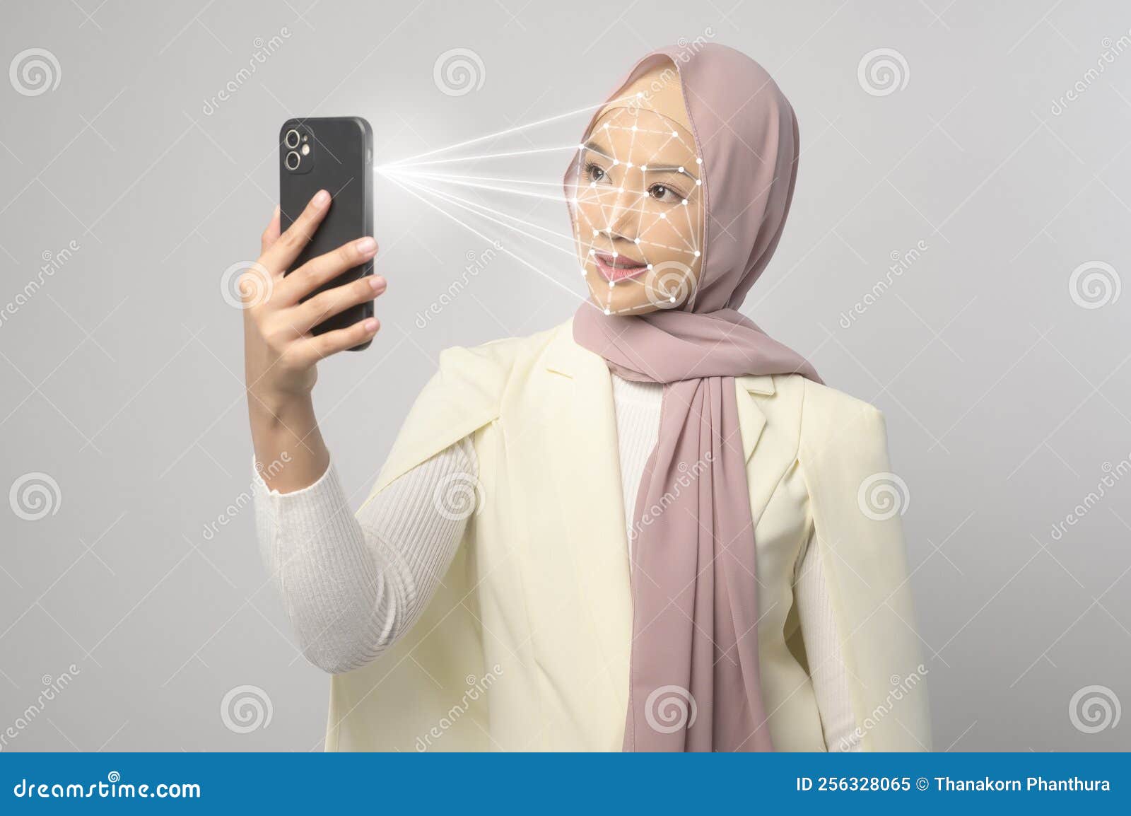 Beautiful Woman Is Scanning Her Face With Facial Recognition System