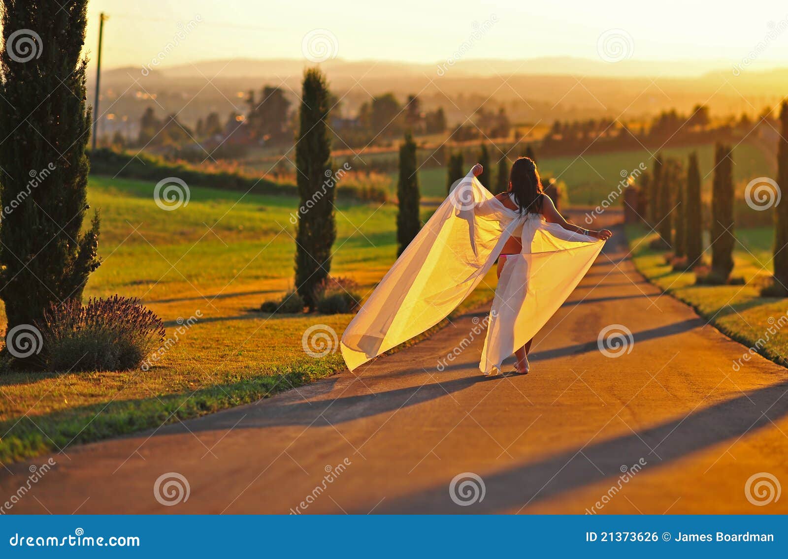 Beautiful Woman into the Setting Sun Stock Photo - Image of bare, woman ...
