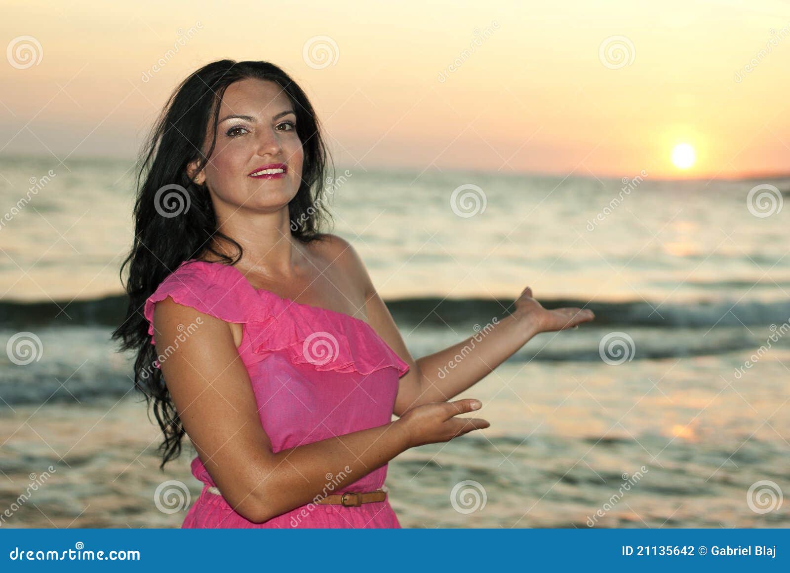 Beautiful Woman Showing Sunset Stock Photo - Image of palms, beauty ...