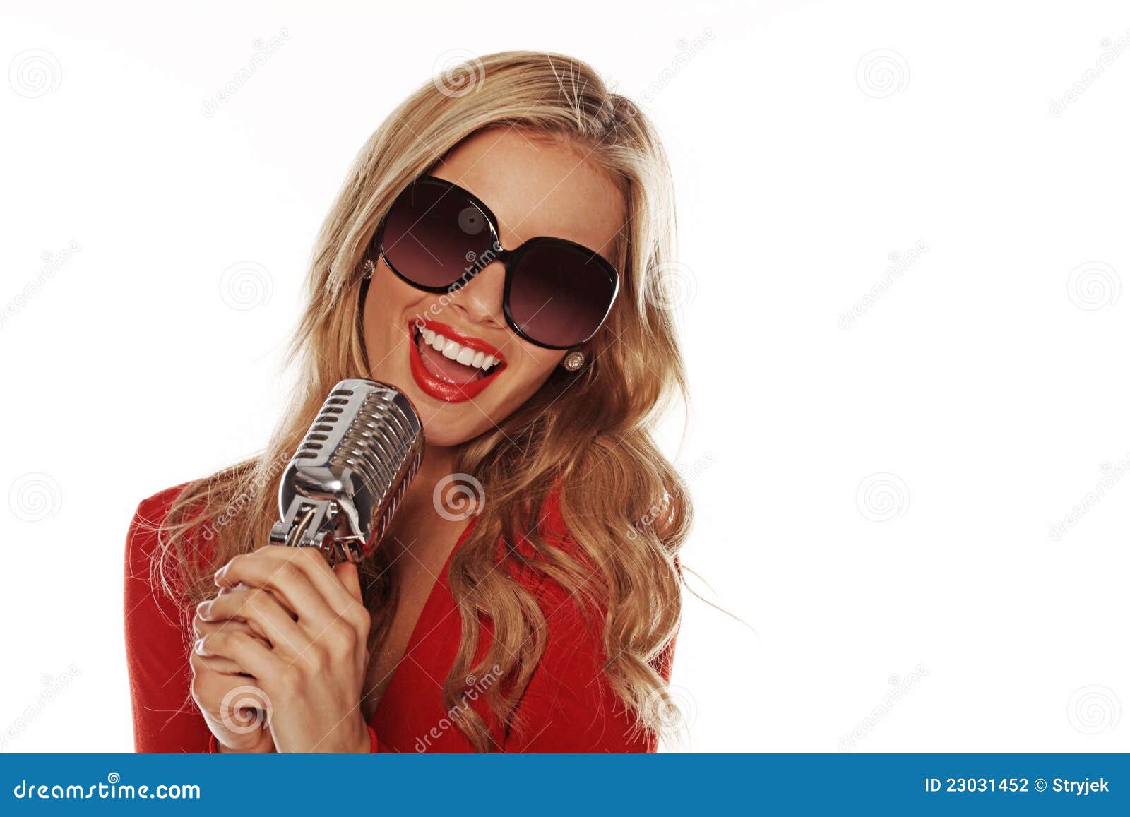 Beautiful Woman Singing into Microphone Stock Photo - Image of handheld ...