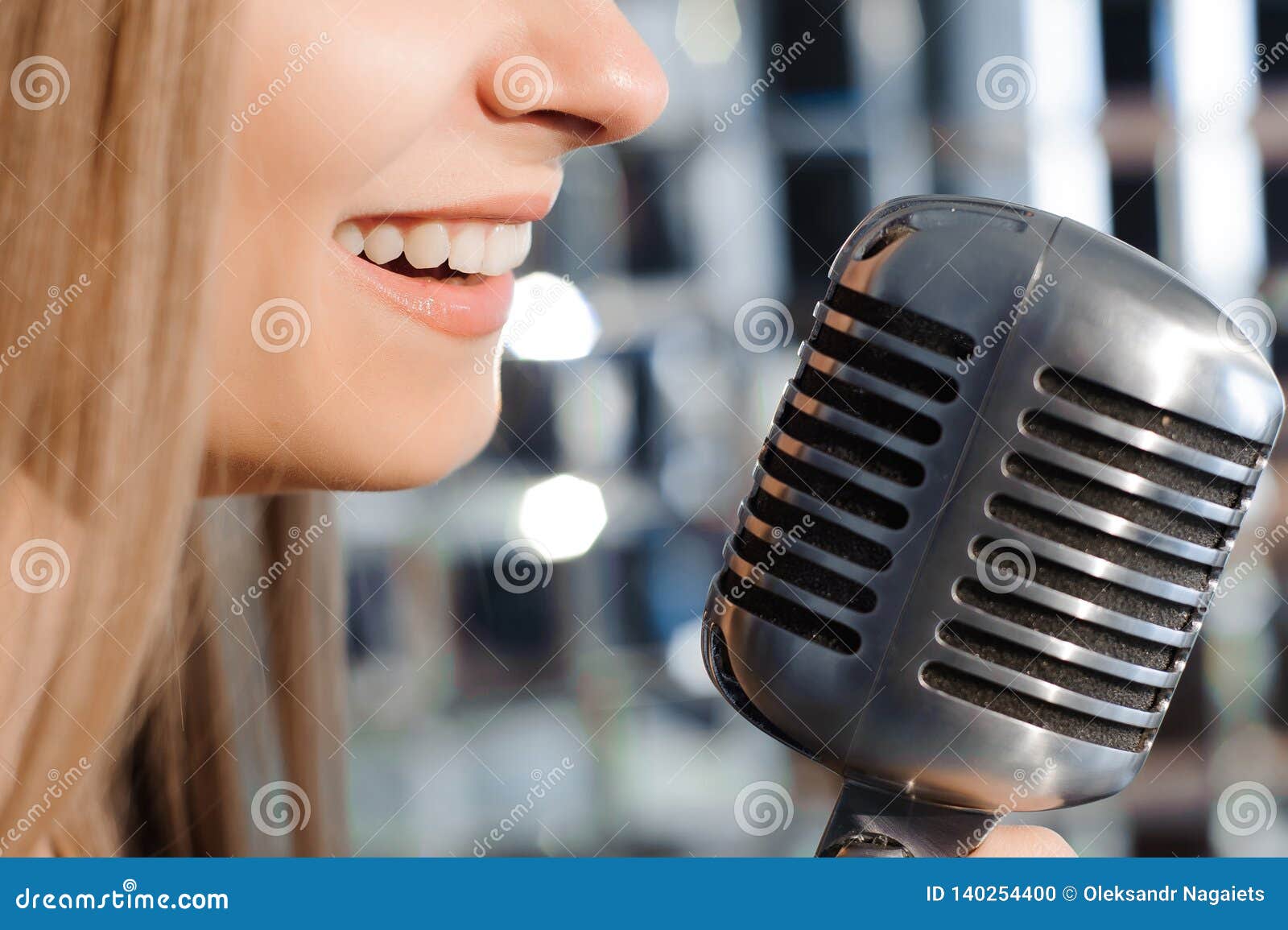 Beautiful Woman Singing on the Stage Next To the Microphone. Editorial ...