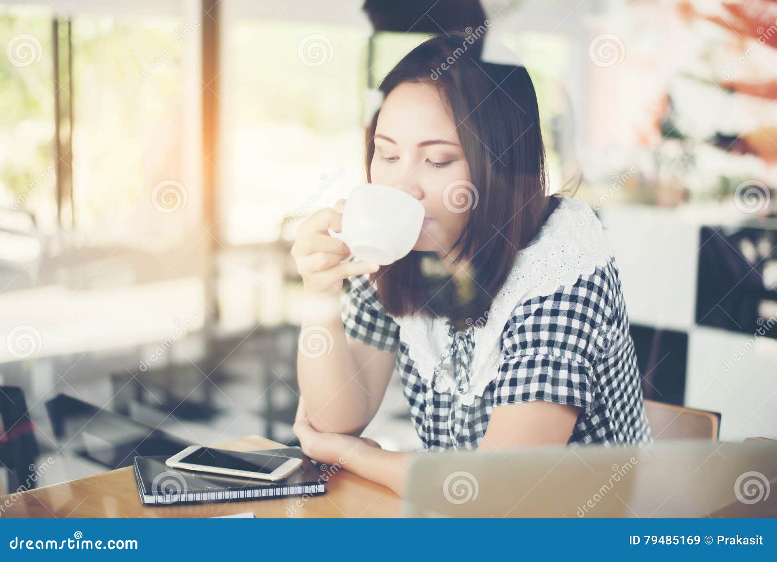 Beautiful Woman Sitting and Drinking Coffee at Cafe. Stock Image ...