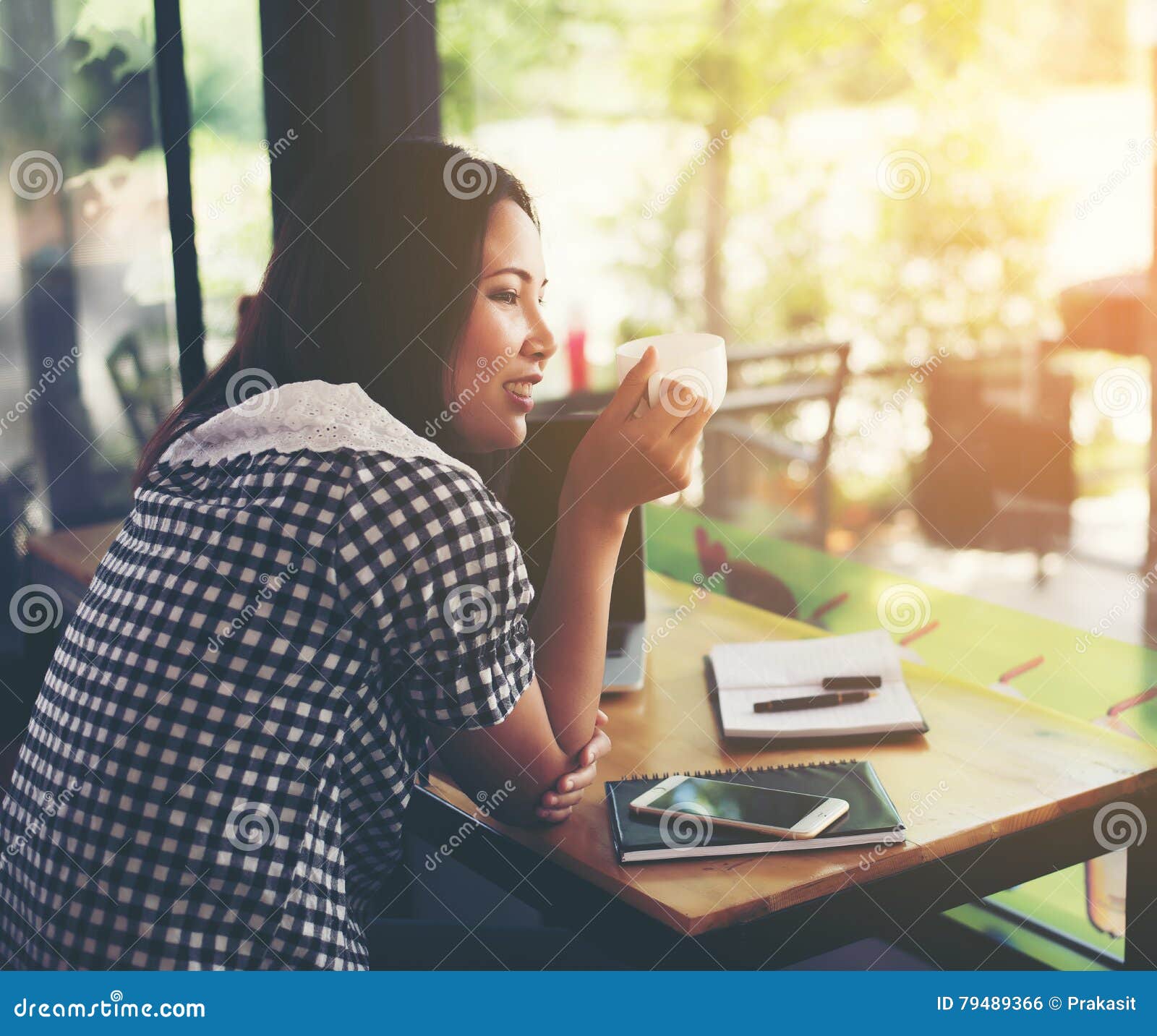 Beautiful Woman Sitting and Drinking Coffee at Cafe. Stock Photo ...