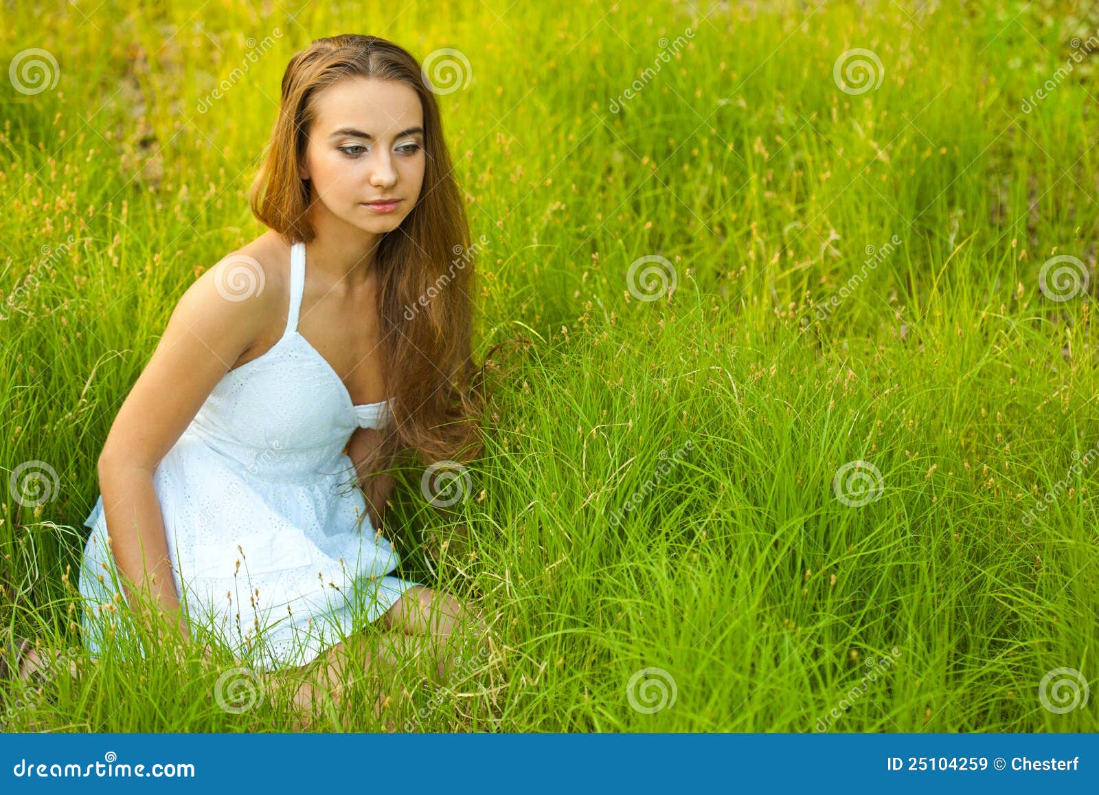 Beautiful Woman Sitting in the Grass Stock Image - Image of girl, park ...
