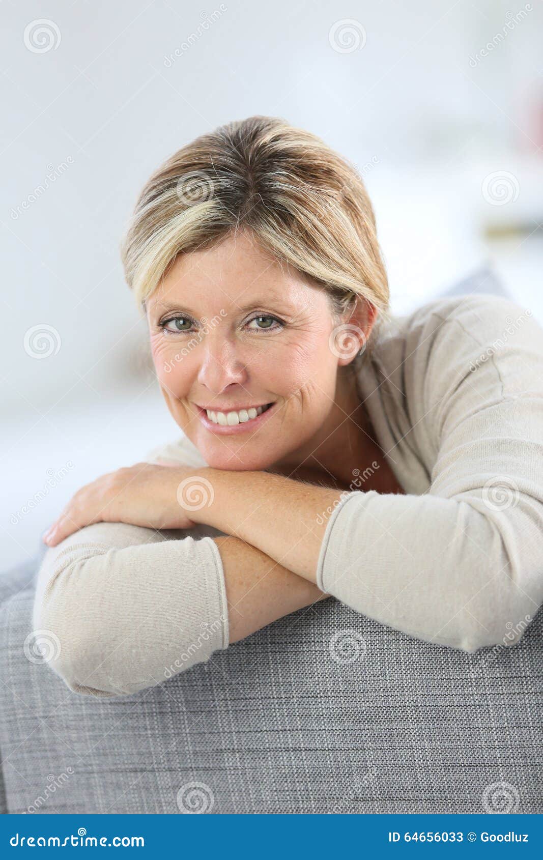 Beautiful Woman Sitting on Sofa Stock Image - Image of smart, woman ...