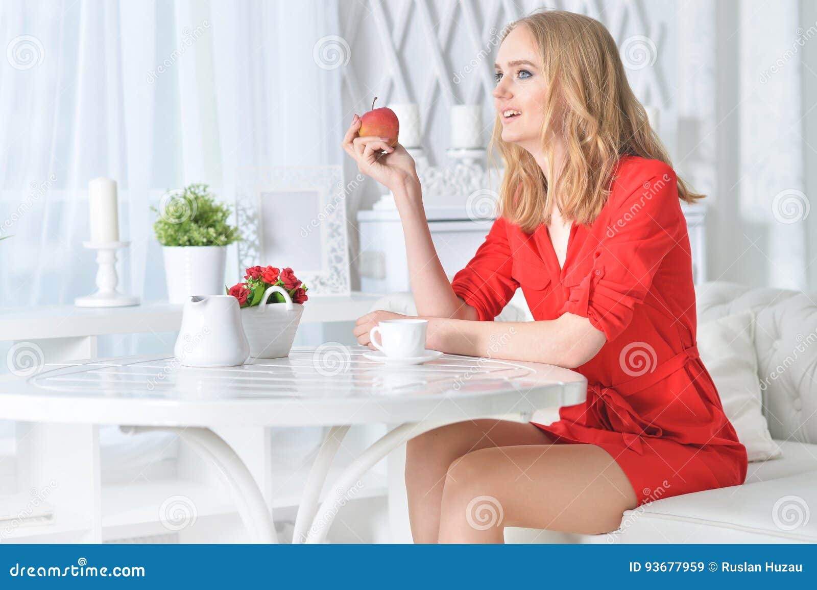 Beautiful Woman Sitting at a Table Drinking Tea Stock Image - Image of ...