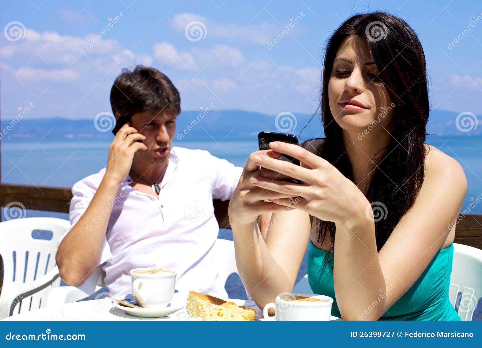 Beautiful Woman Smiling while Texting on Cellphone Stock Image - Image ...