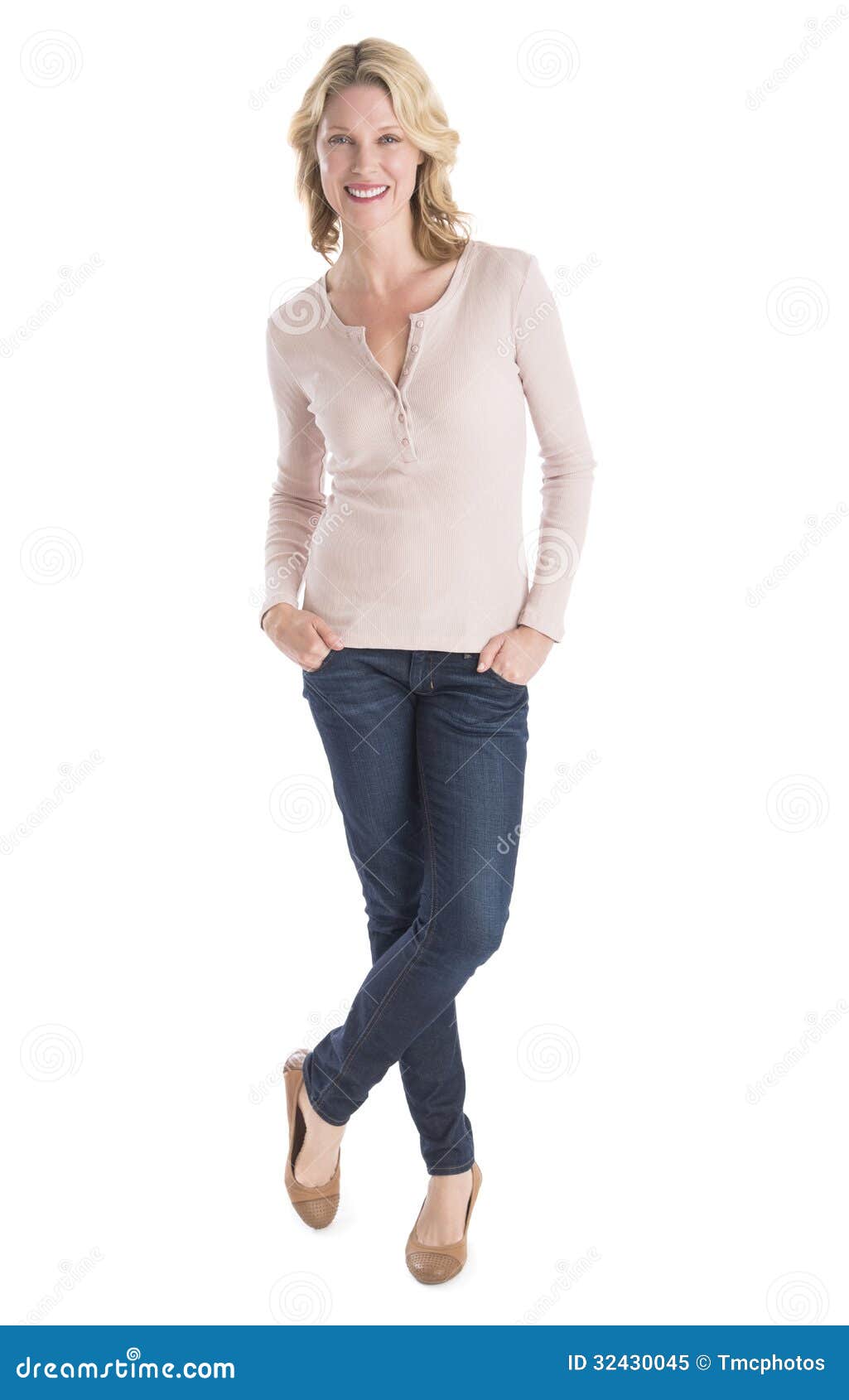 Beautiful Woman Standing Hands In Pockets Over White Background Stock